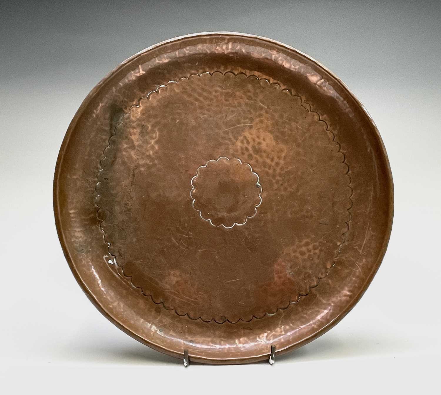 Lot 107 - A Newlyn copper shallow dish with a