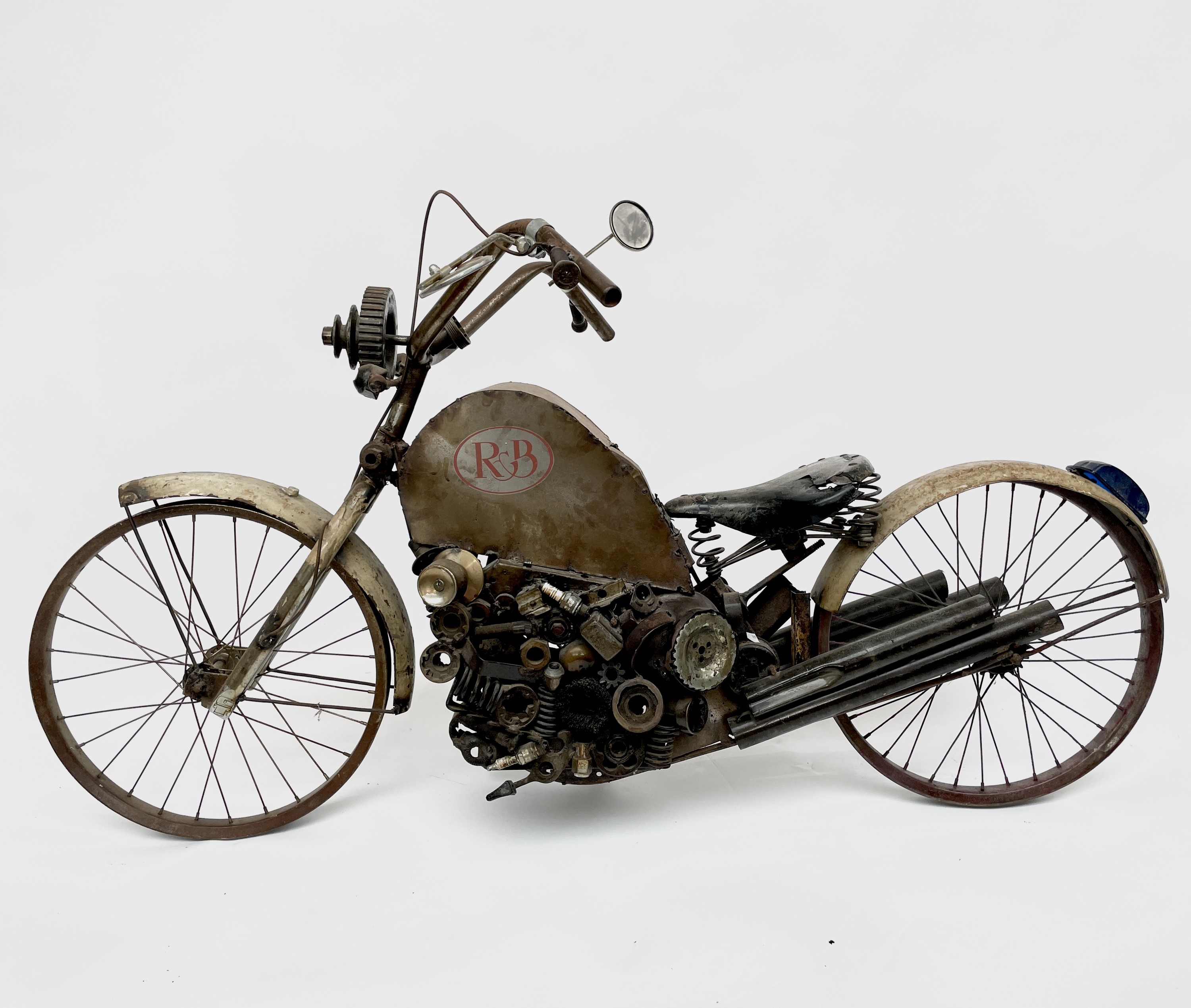 Lot 162 - A scrap metal model of a motorcycle, welded