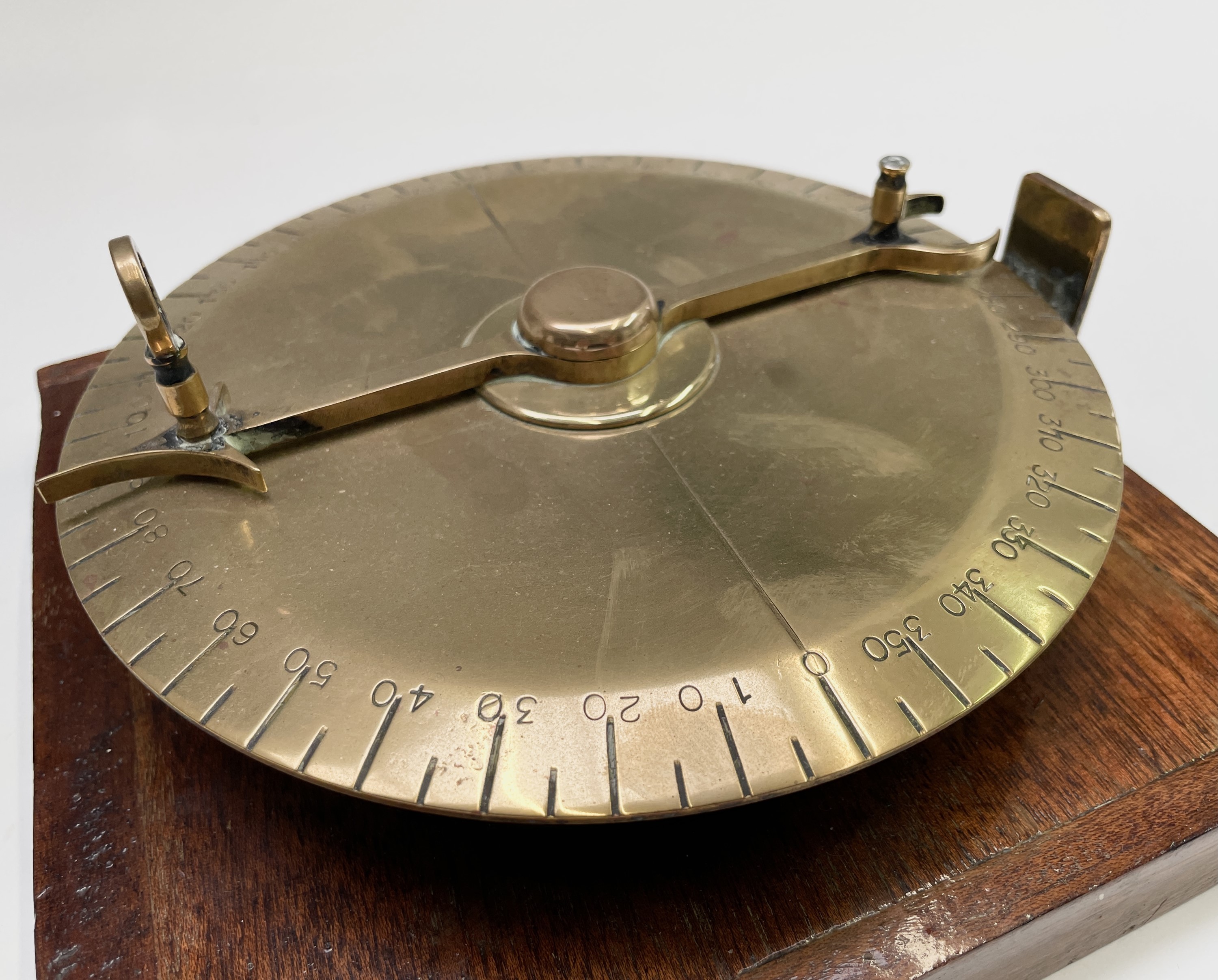 Lot 215 - A brass maritime sighting indicator, early