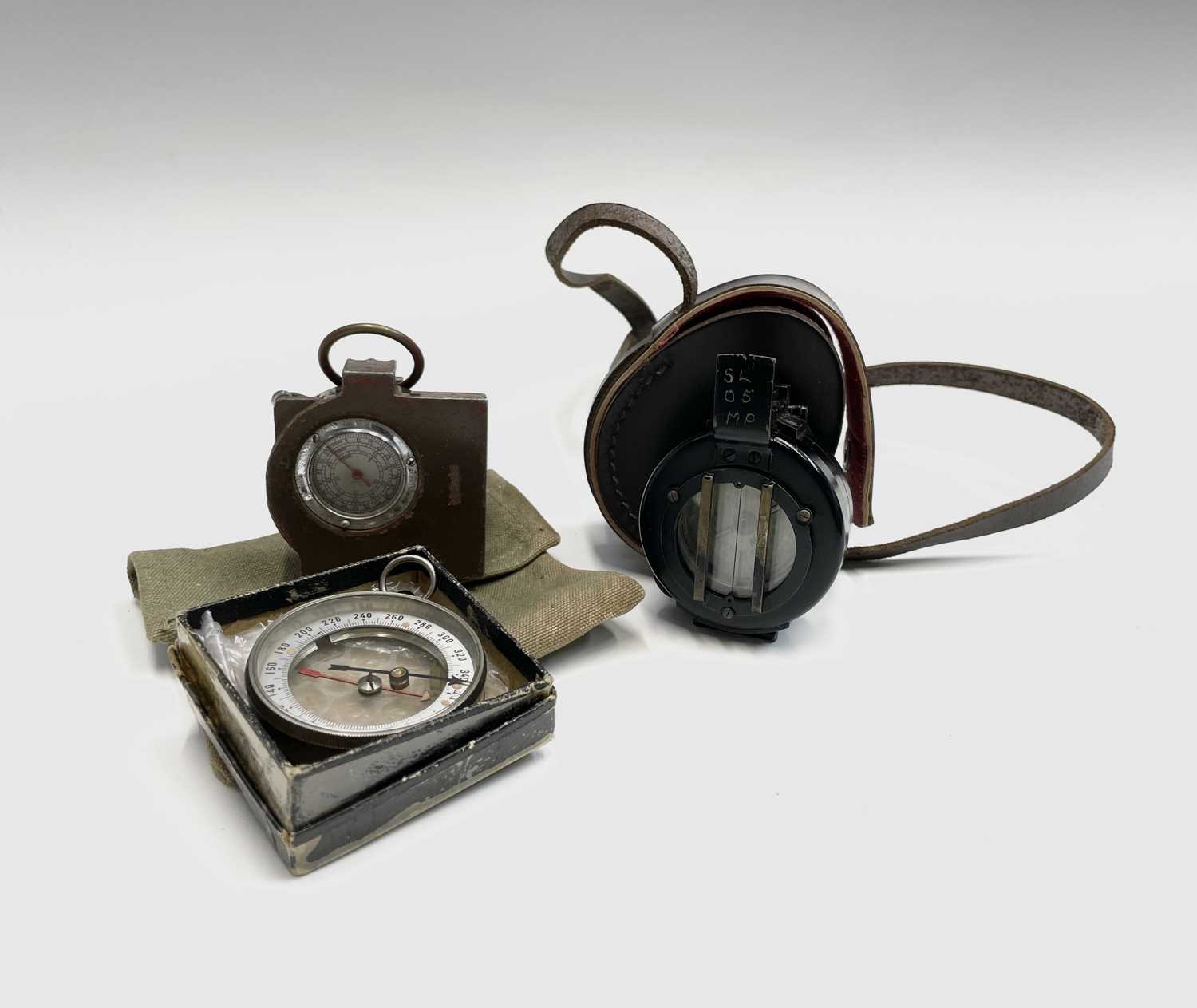 Lot 566 - A military M-73 prismatic handheld compass,
