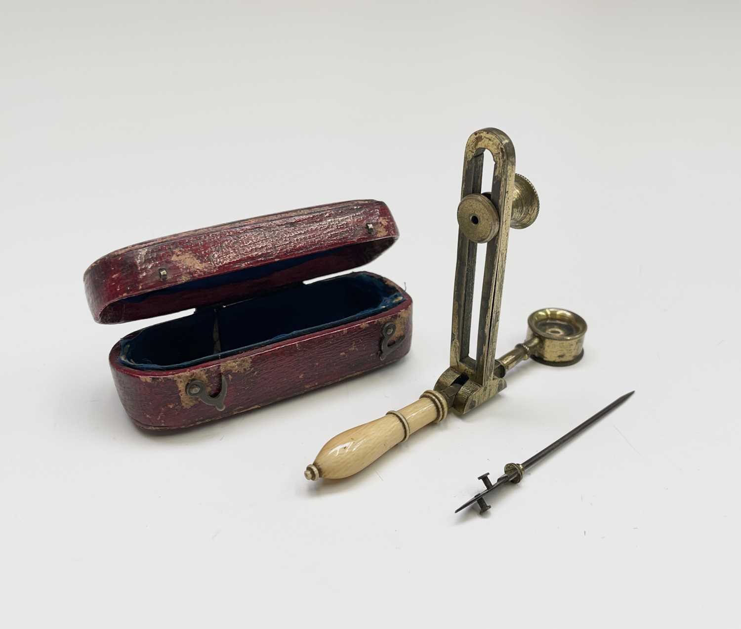 Lot 569 - A George III ivory and brass