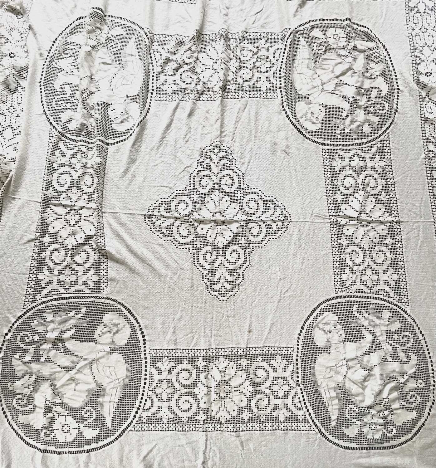 Lot 2844 - A machine lace counterpane with large