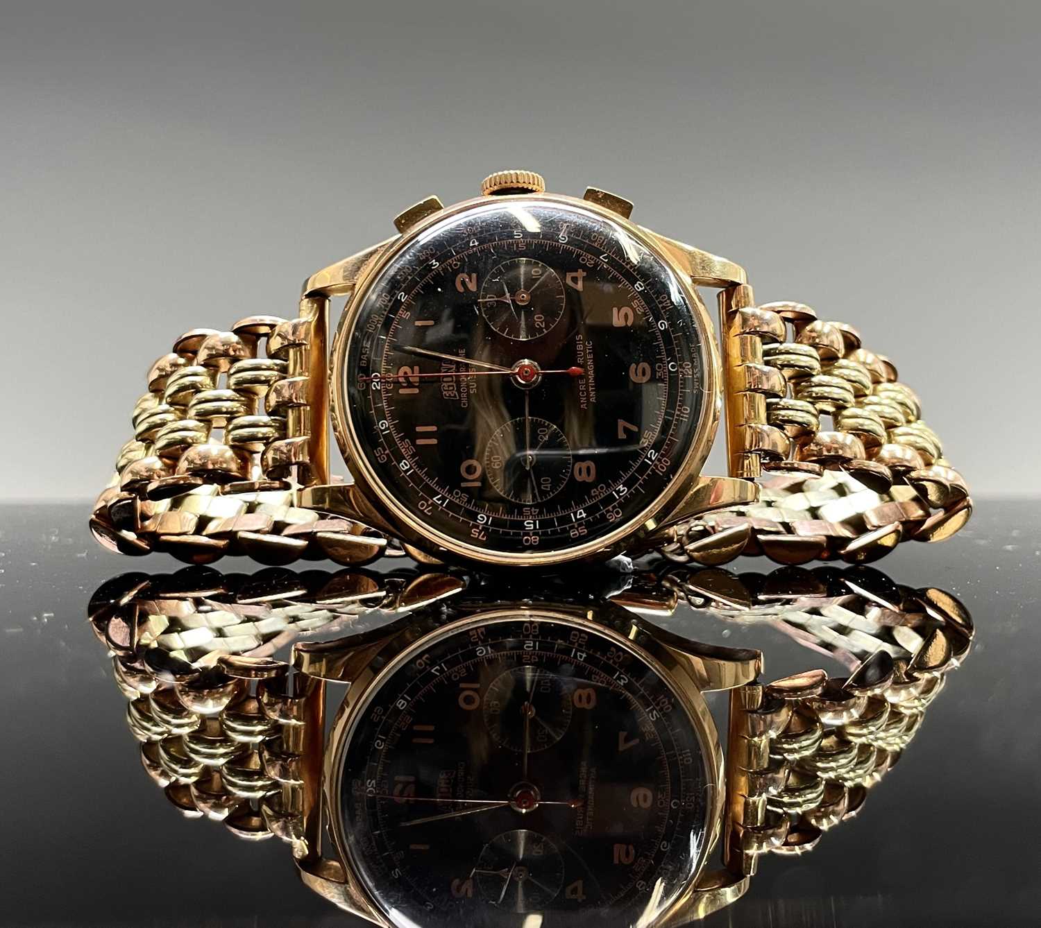 Lot 231 - An 18ct gold cased Egona chronographe black