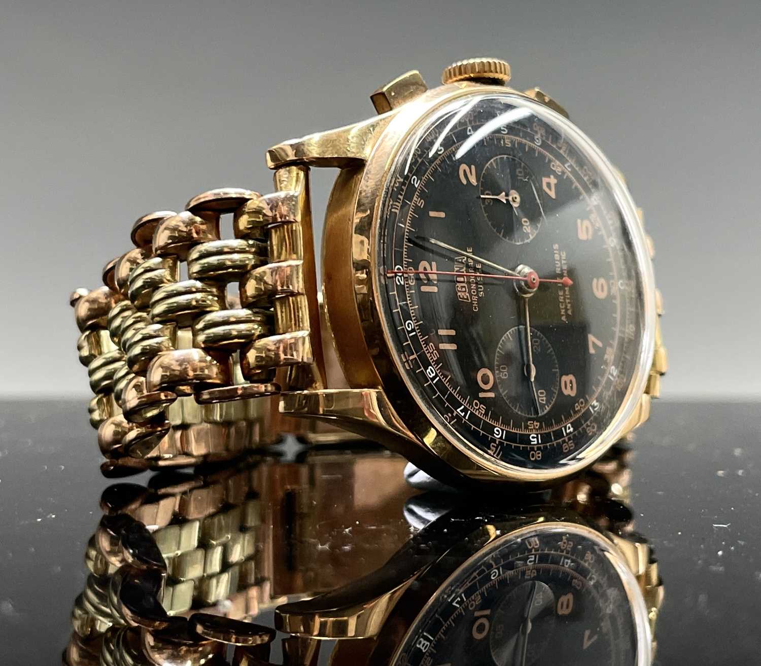 Lot 231 - An 18ct gold cased Egona chronographe black