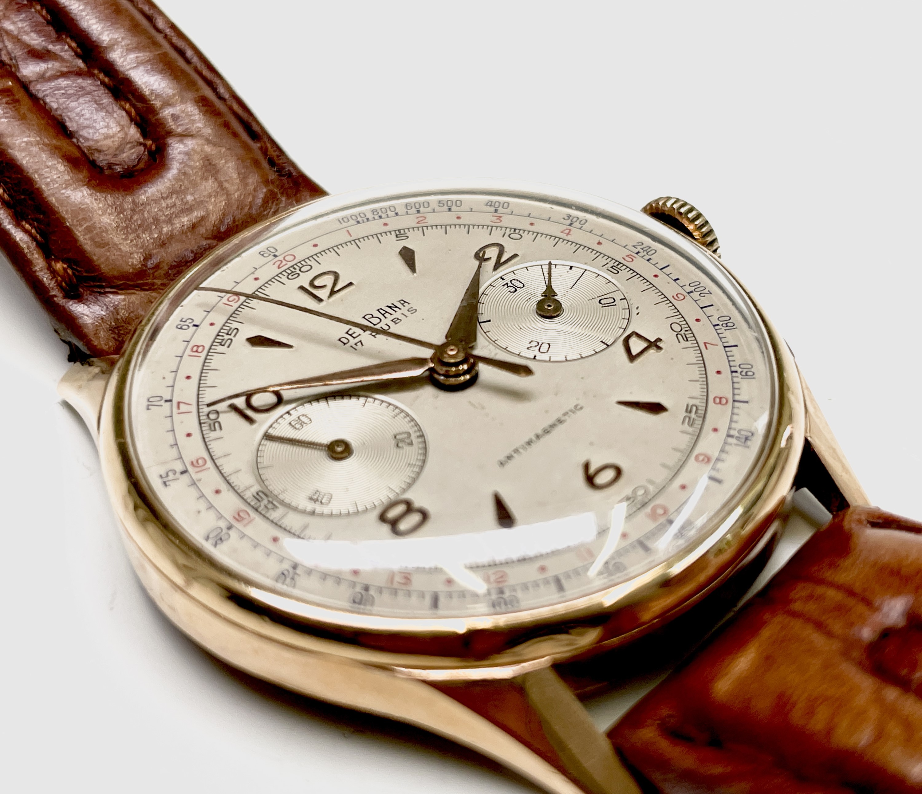 Lot 78 - A Delbana 18ct gold chronograph wristwatch