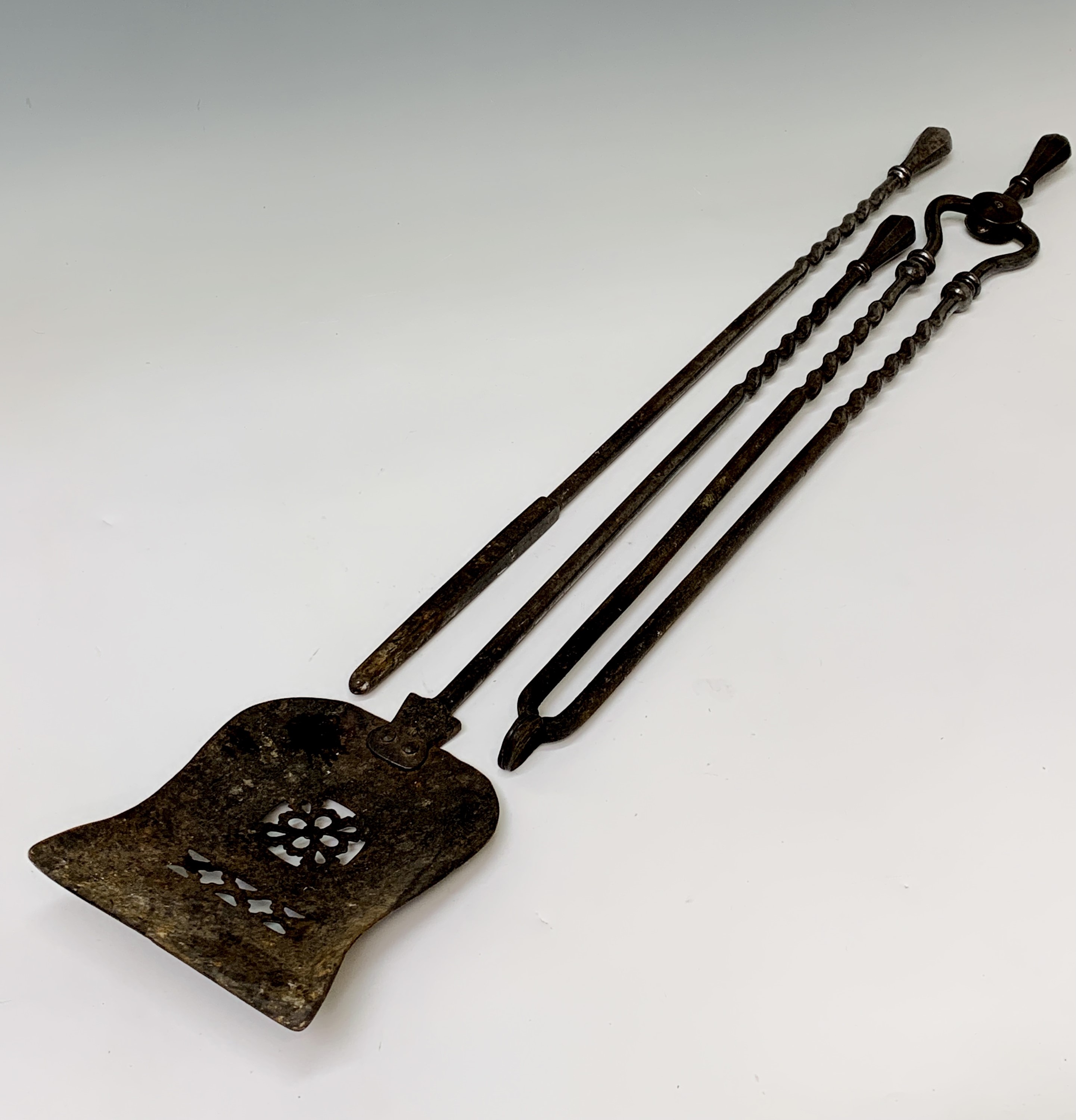 Lot 307 - A set of three steel fire irons, 19th