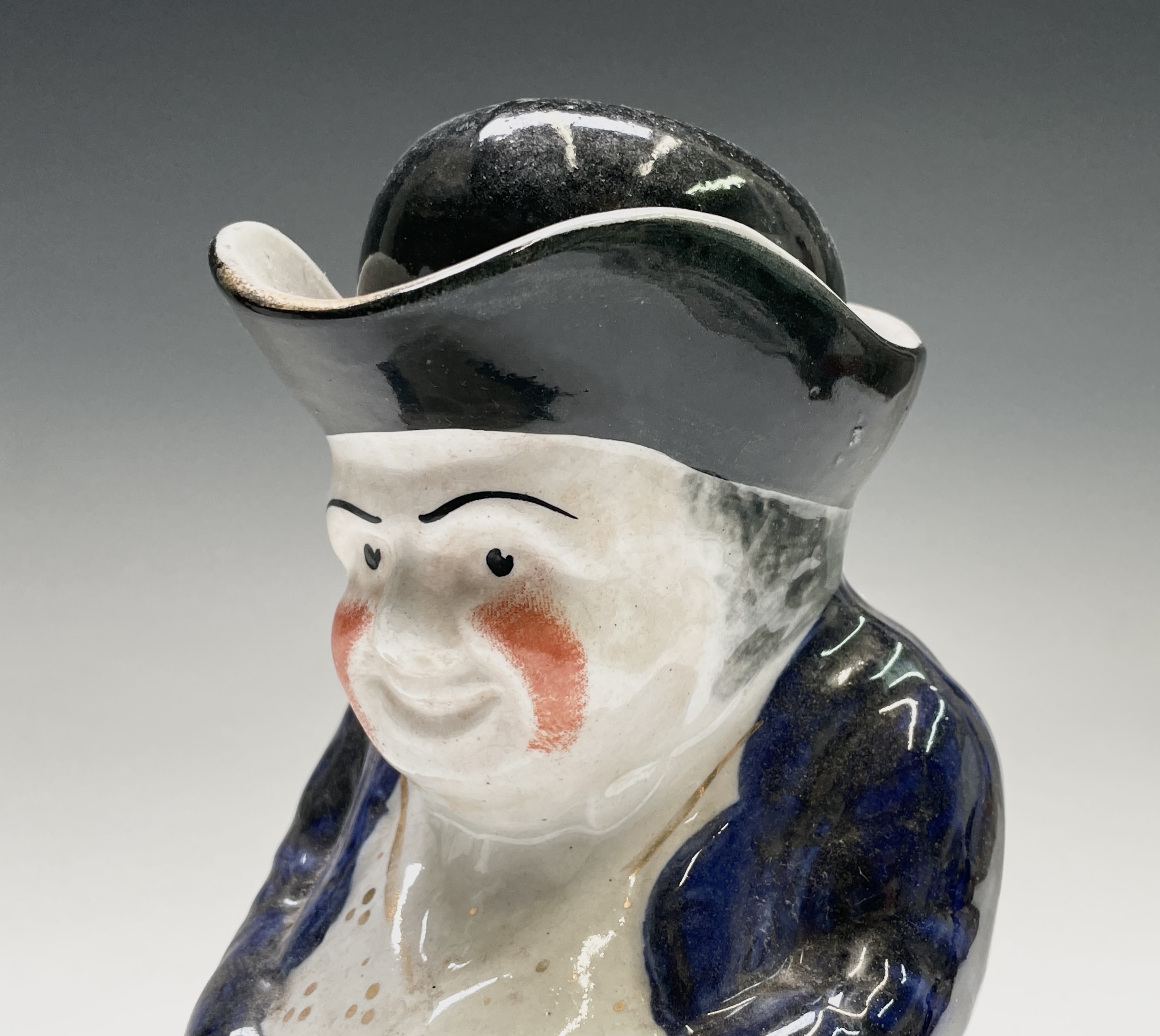 Lot 290 - A Staffordshire pottery Toby jug, early 19th