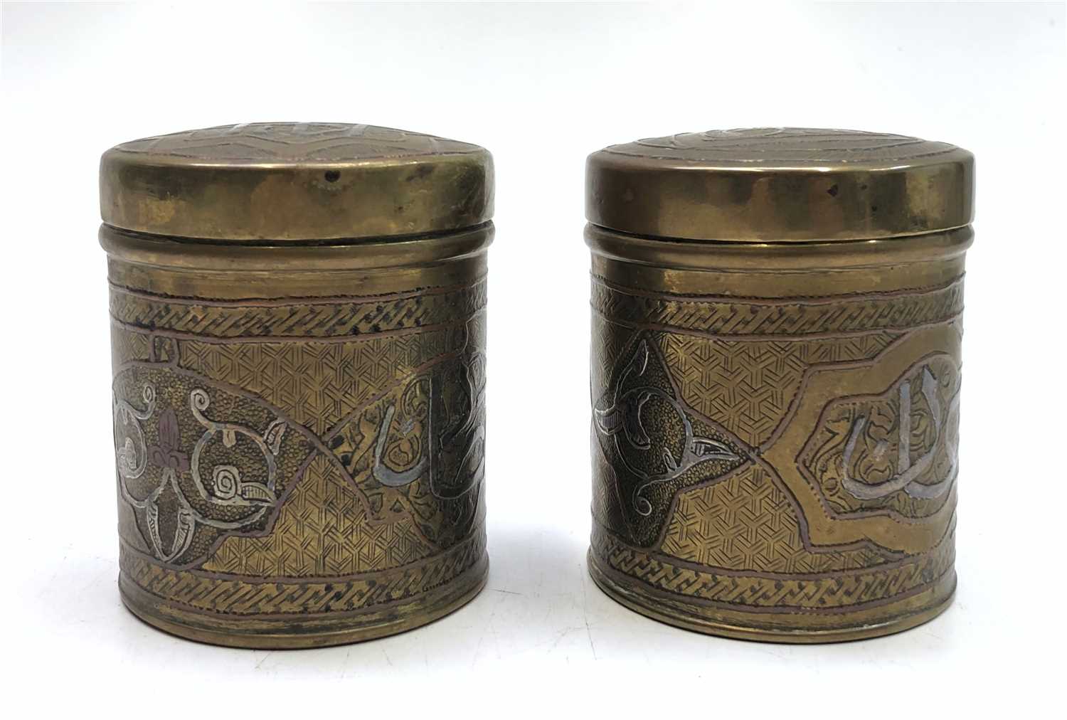 Lot 742 - Two Cairoware brass jars and covers, circa
