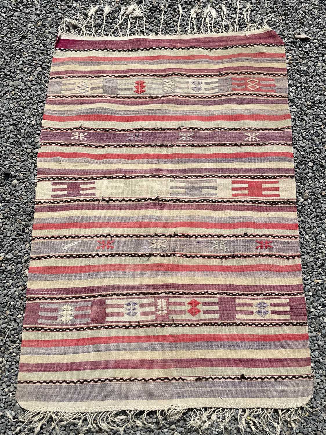 Lot 1270 - A Persian kelim rug, with multiple