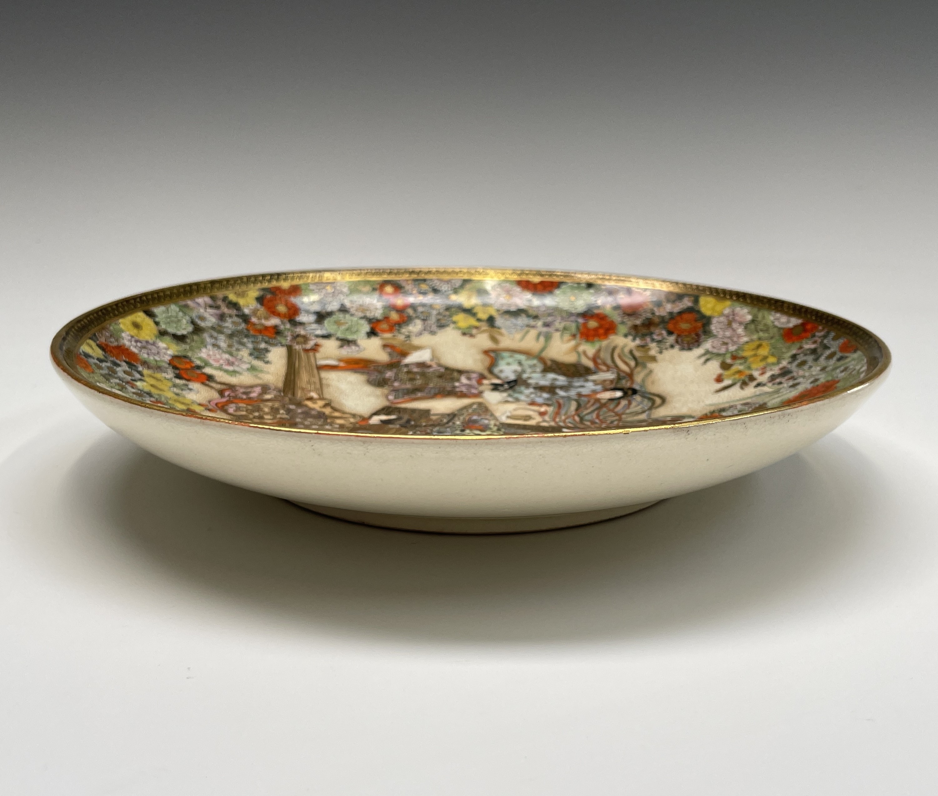 Lot 90 - A Japanese Satsuma plate by Ryuzan, Meiji