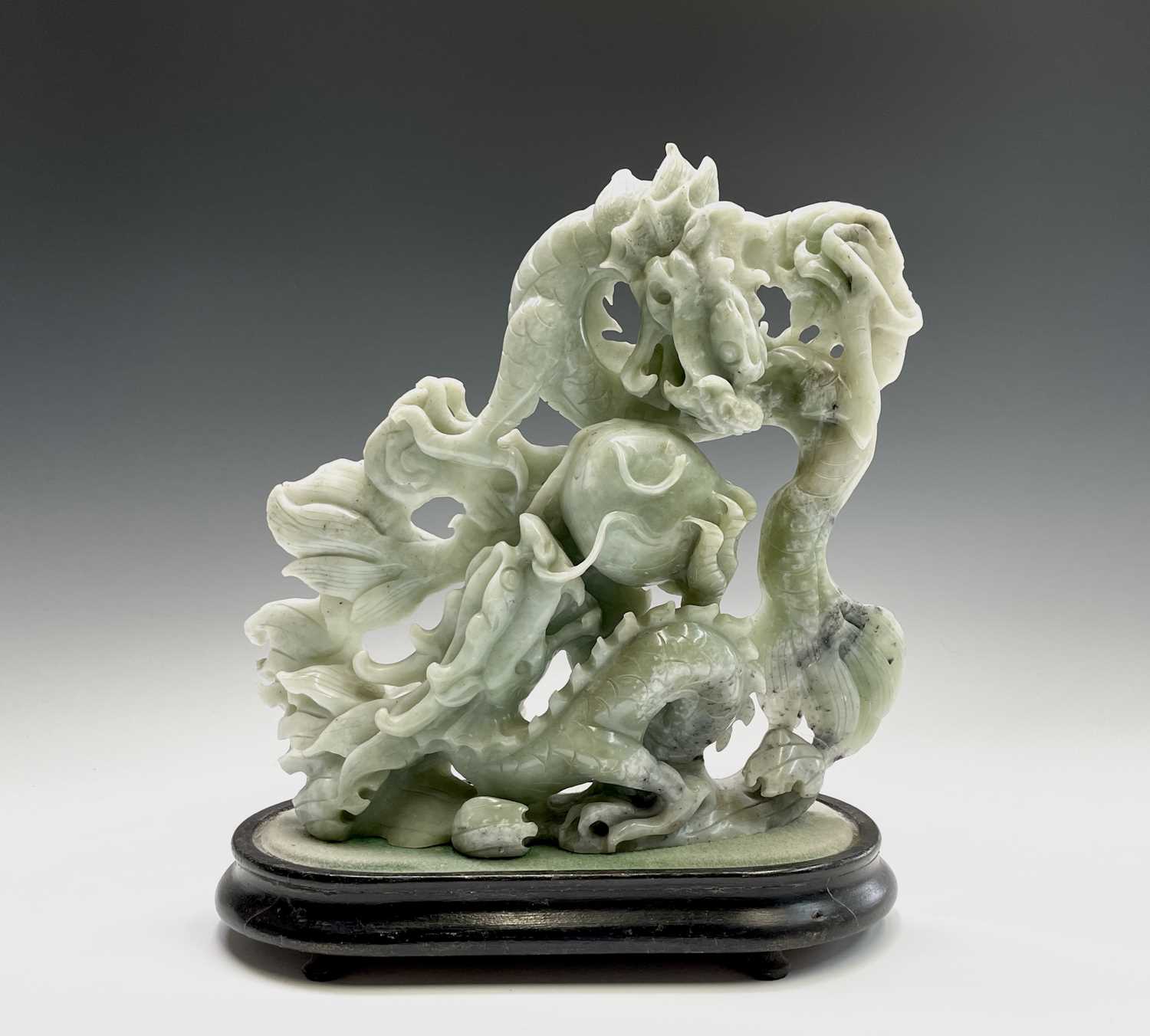 Lot 281 - A Chinese greenstone group, 20th century,