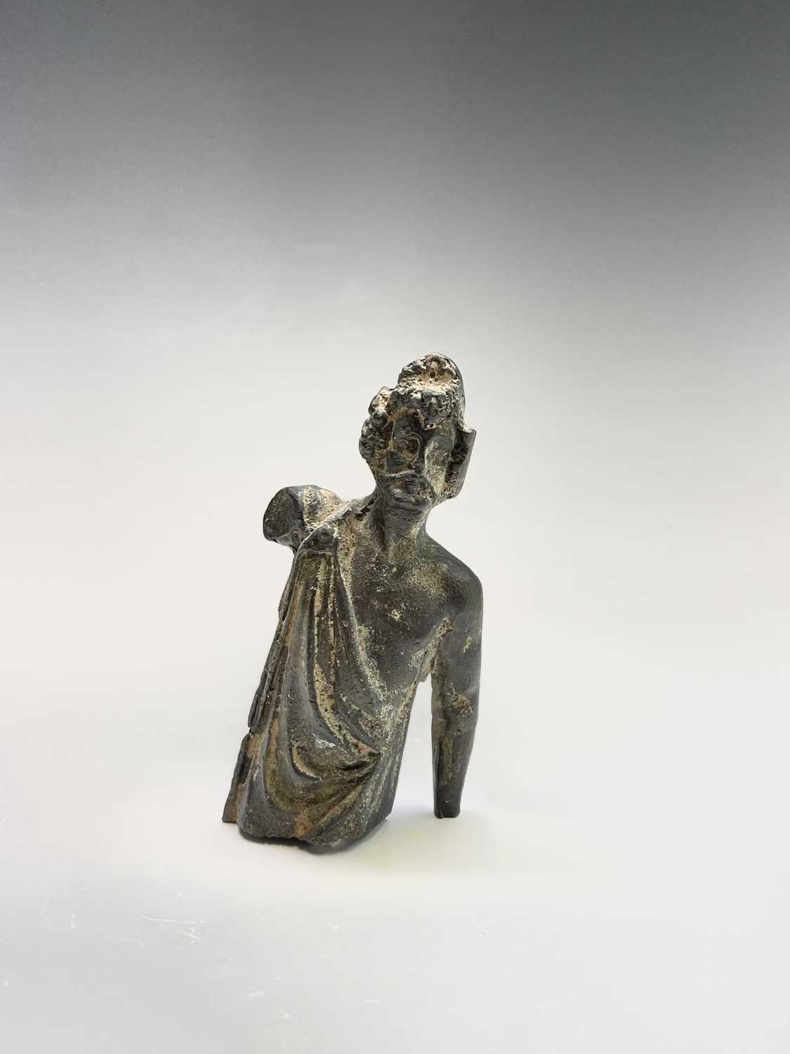 Lot 470 - A bronze bust of a Roman god, height 14cm.