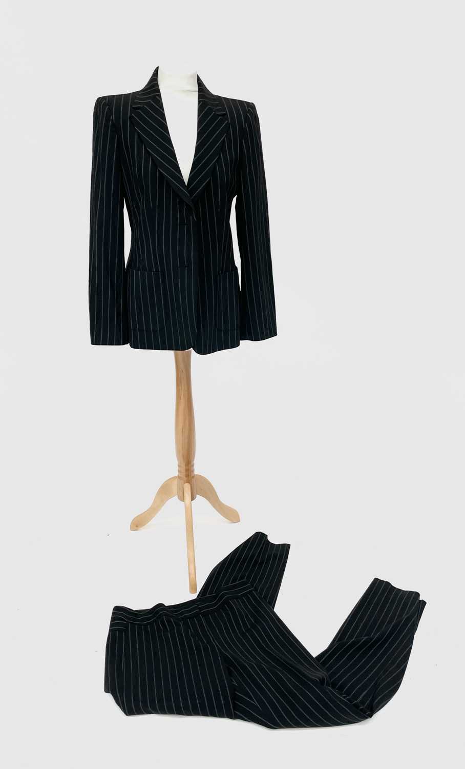 Lot 2856 - A 1980's Jean Muir grey wool mix dress suit,