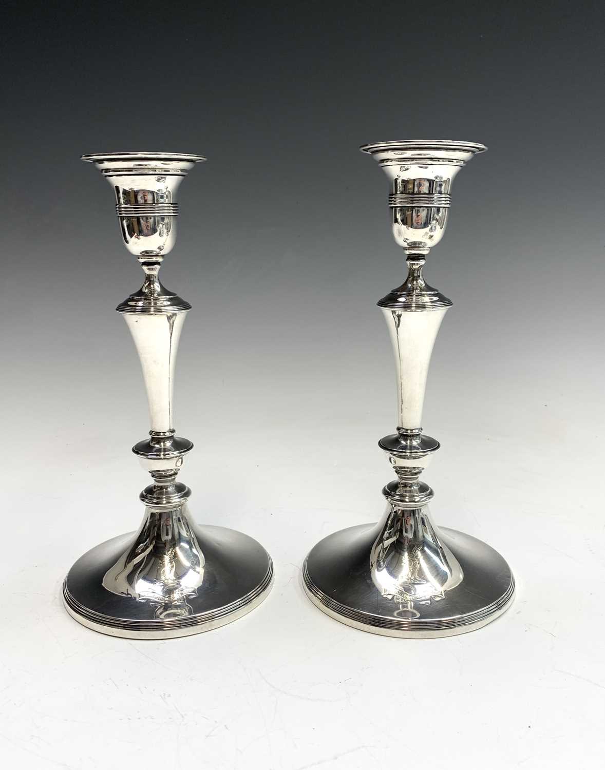 Lot 99 - An Edwardian pair of William Comyns filled
