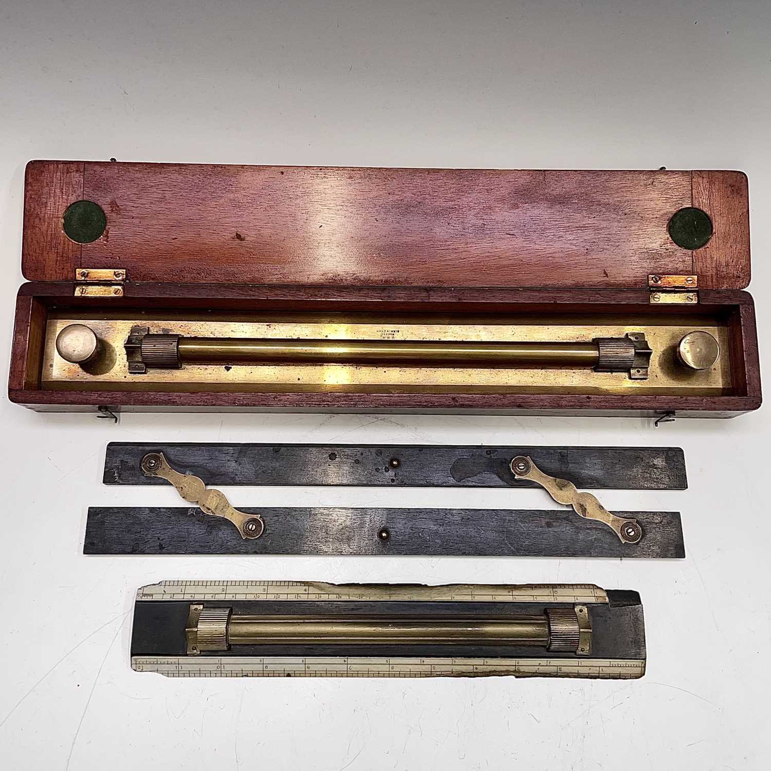 Lot 406 - A brass rolling rule, stamped UWW Makers