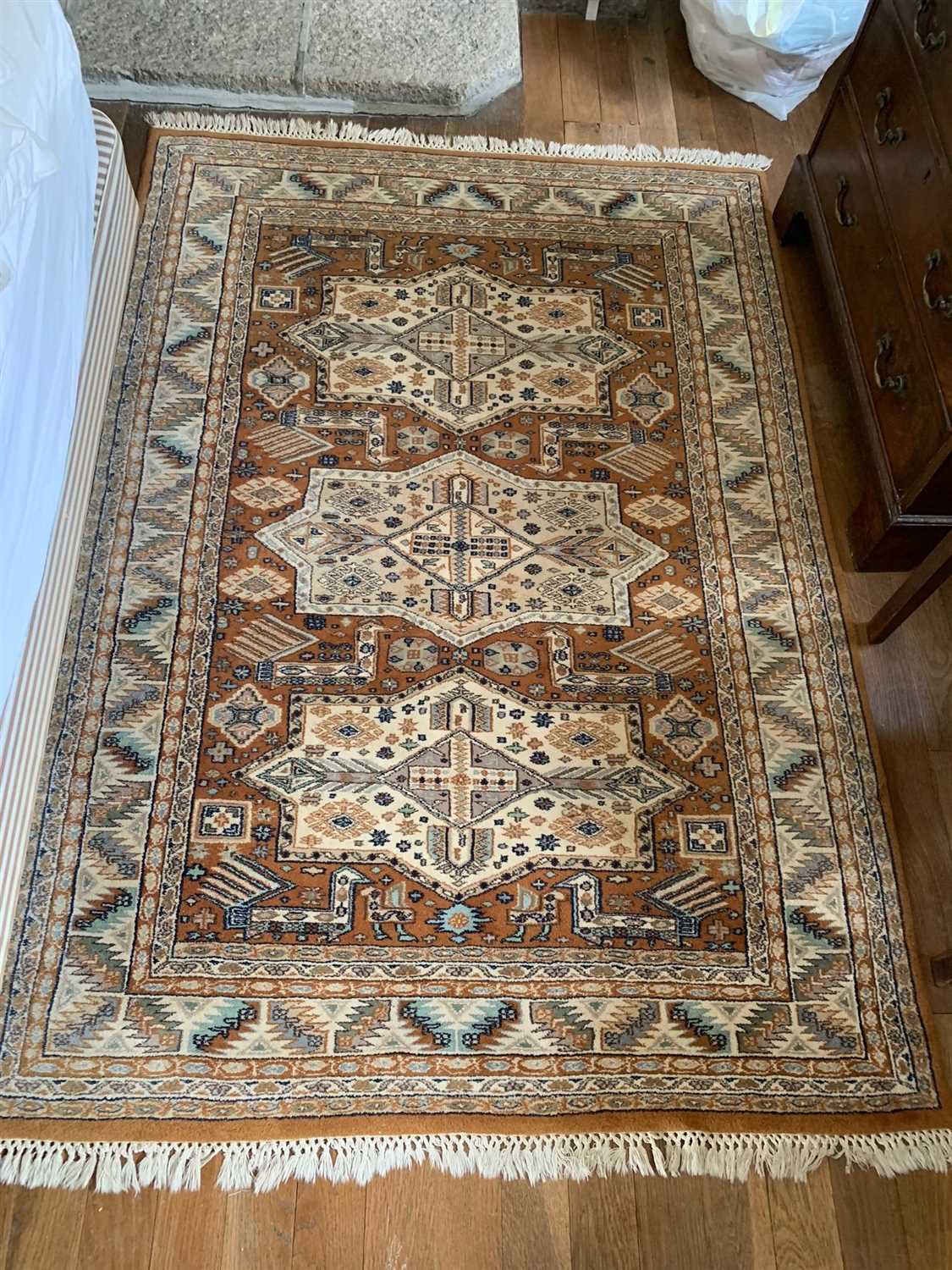 Lot 286 - A Pakistan rug, the camel field with three