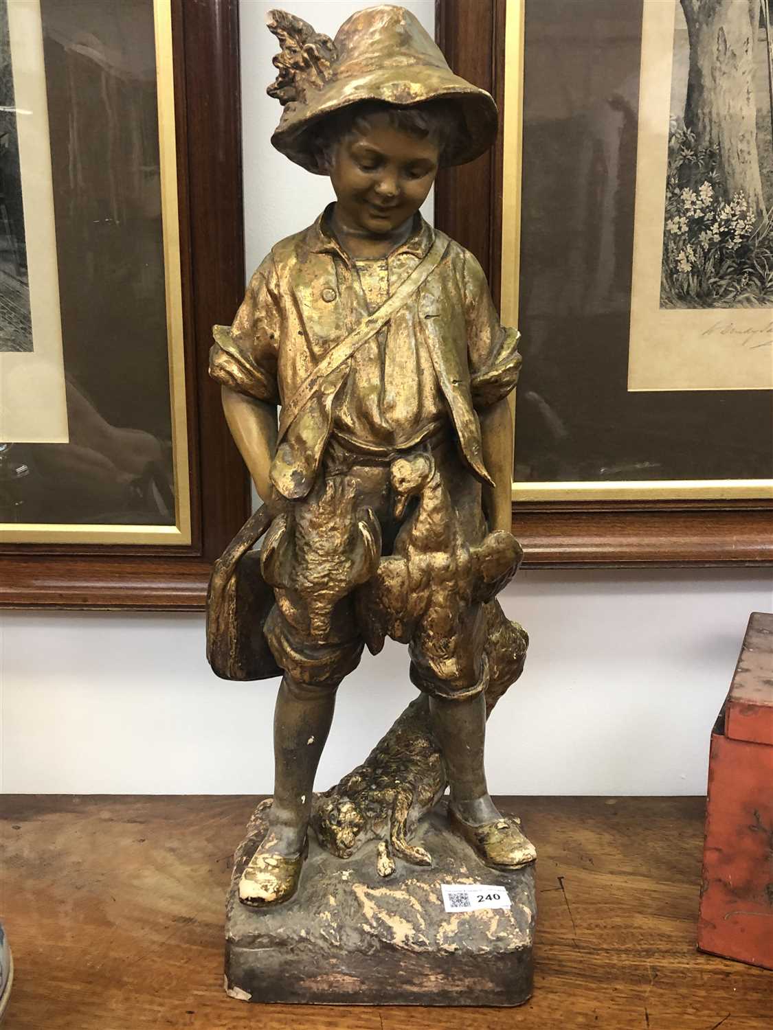 Lot 240 - A Goldscheider gilt decorated pottery figure