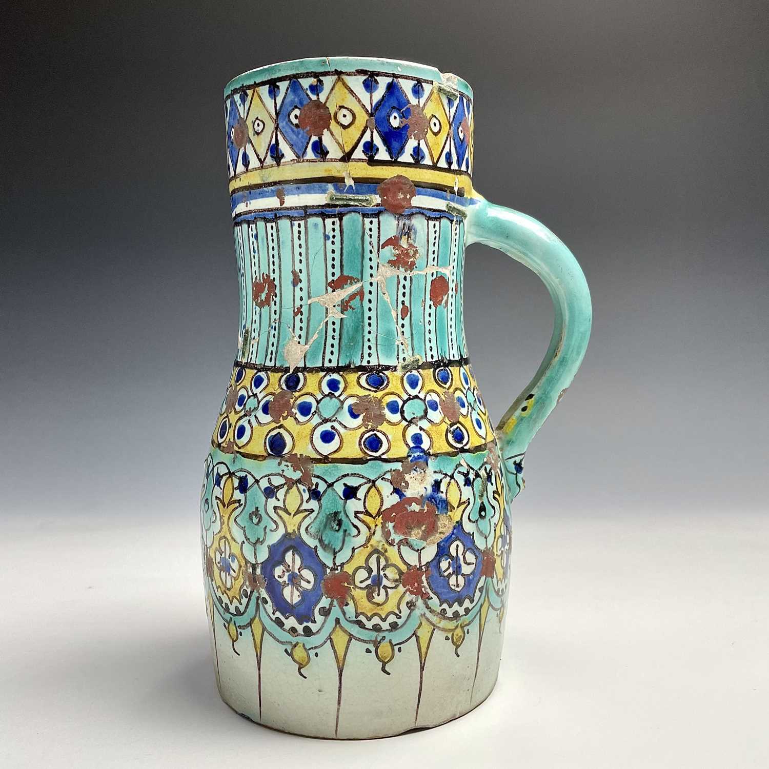 Lot 1002 - A Moroccan pottery jug, 19th century,