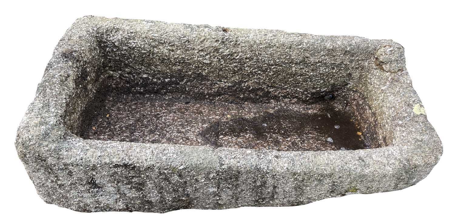 Lot 607 - A large granite trough of rectangular form.