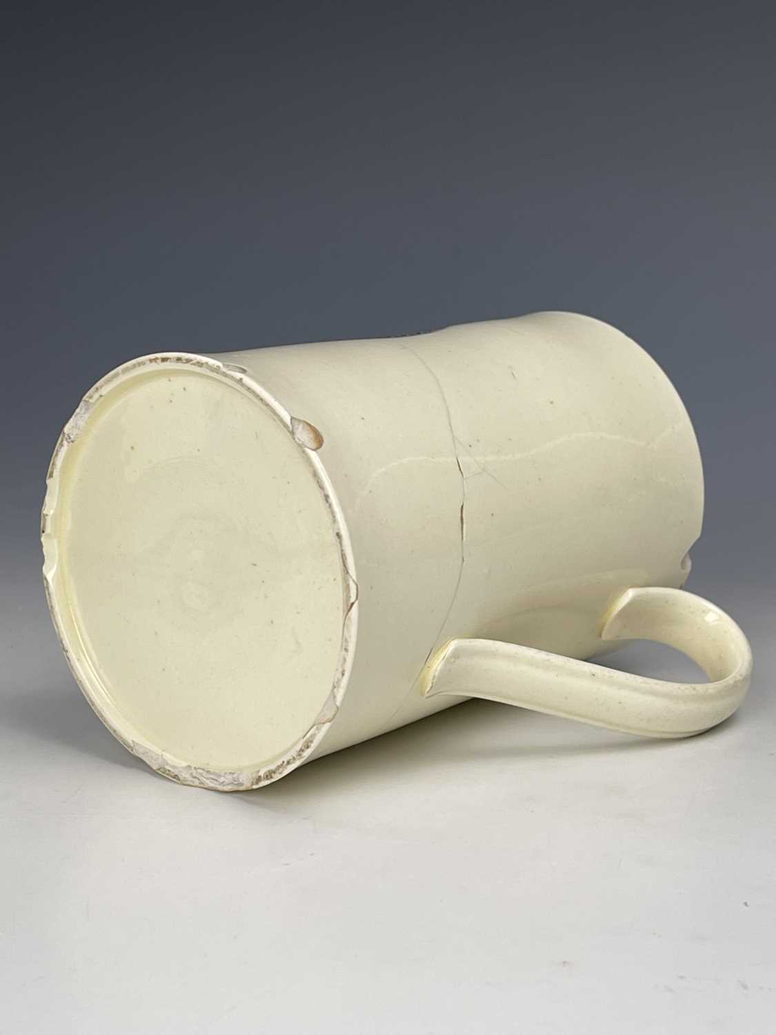 Lot 850 - A creamware mug, circa 1780, transfer