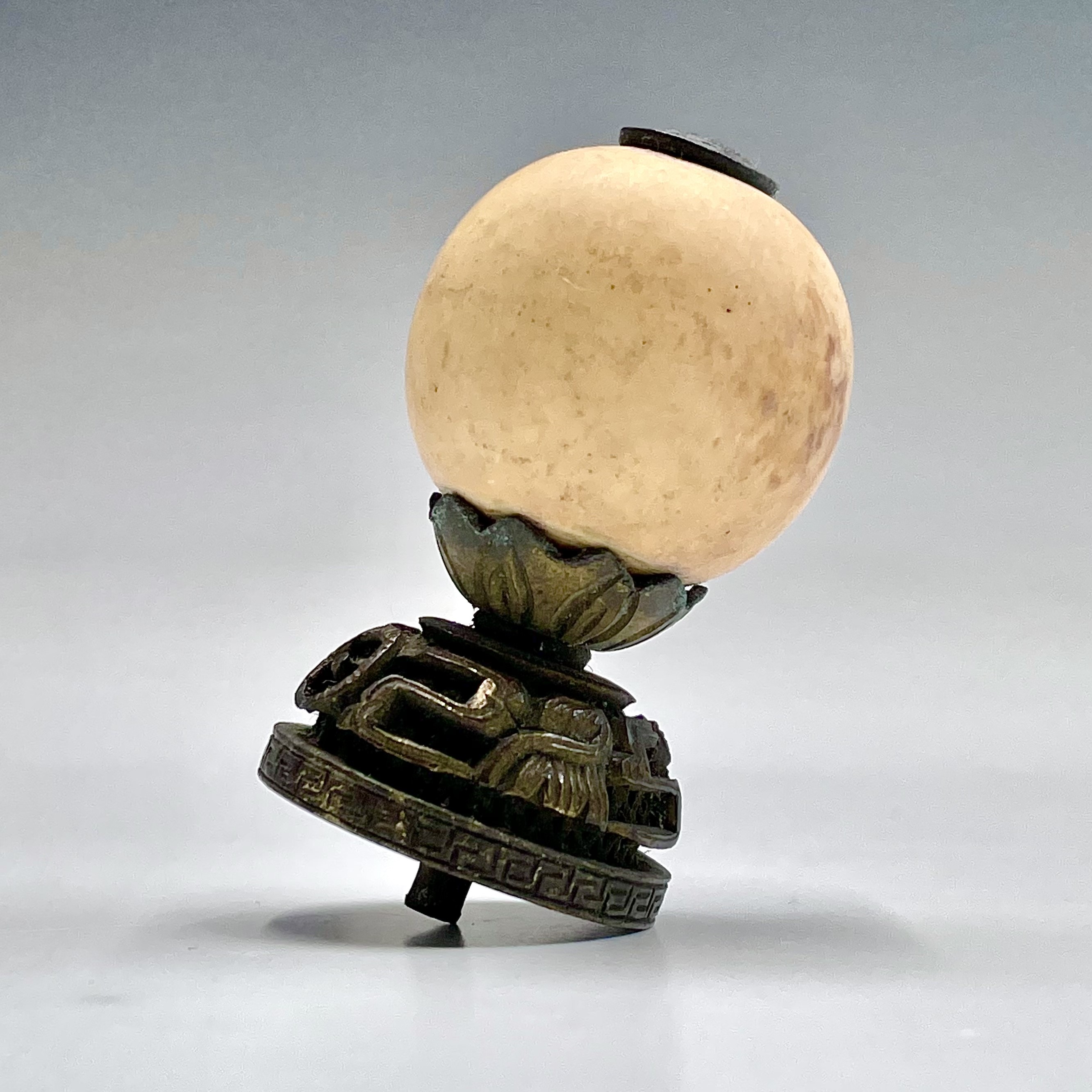 Lot 58 - A Chinese gilt metal and ivory hat finial,