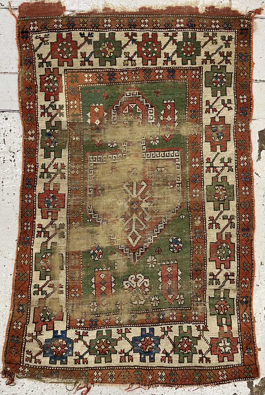 Lot 1212 - A Turkish tribal rug, 19th century, the