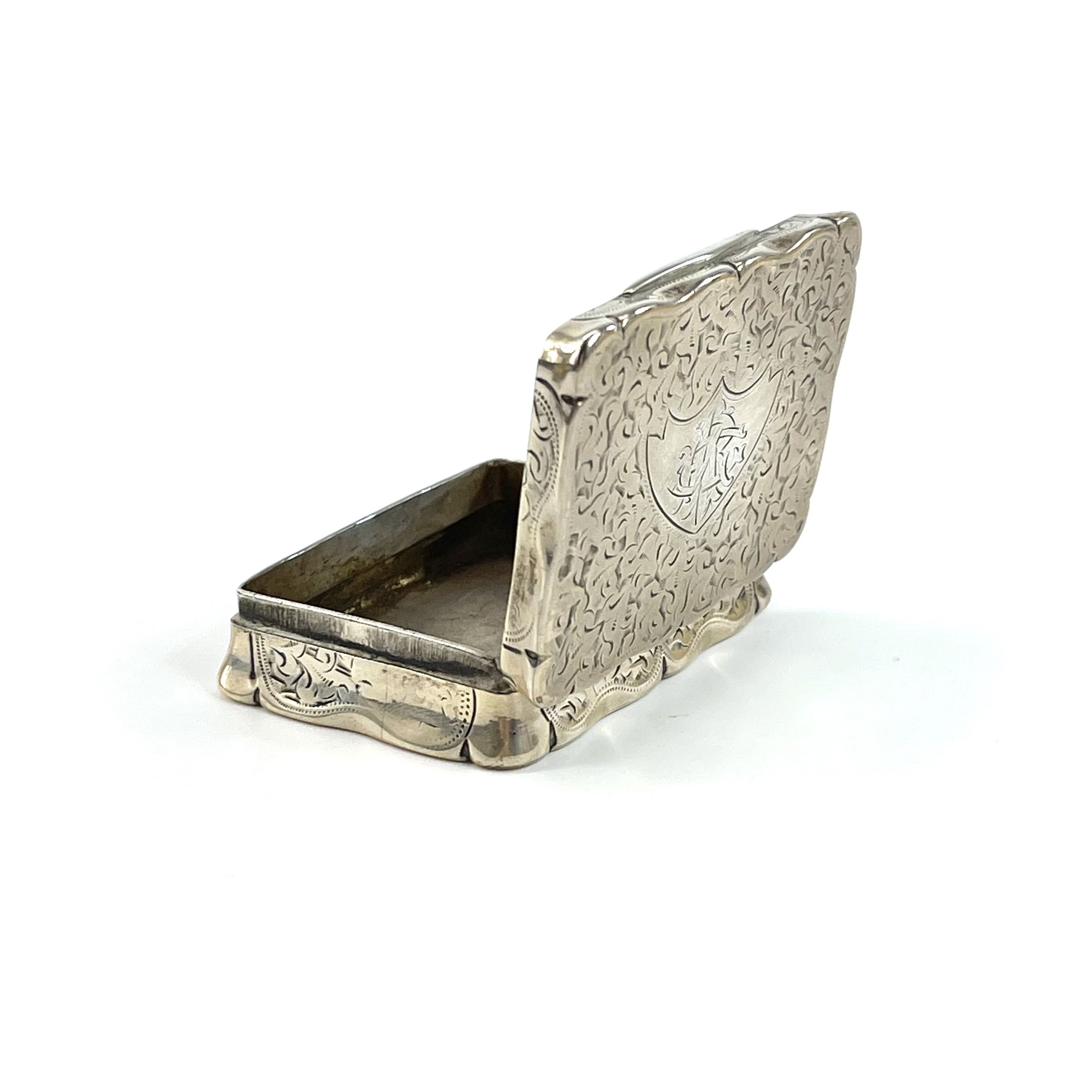 Lot 1 - A Victorian silver snuff box with engraved