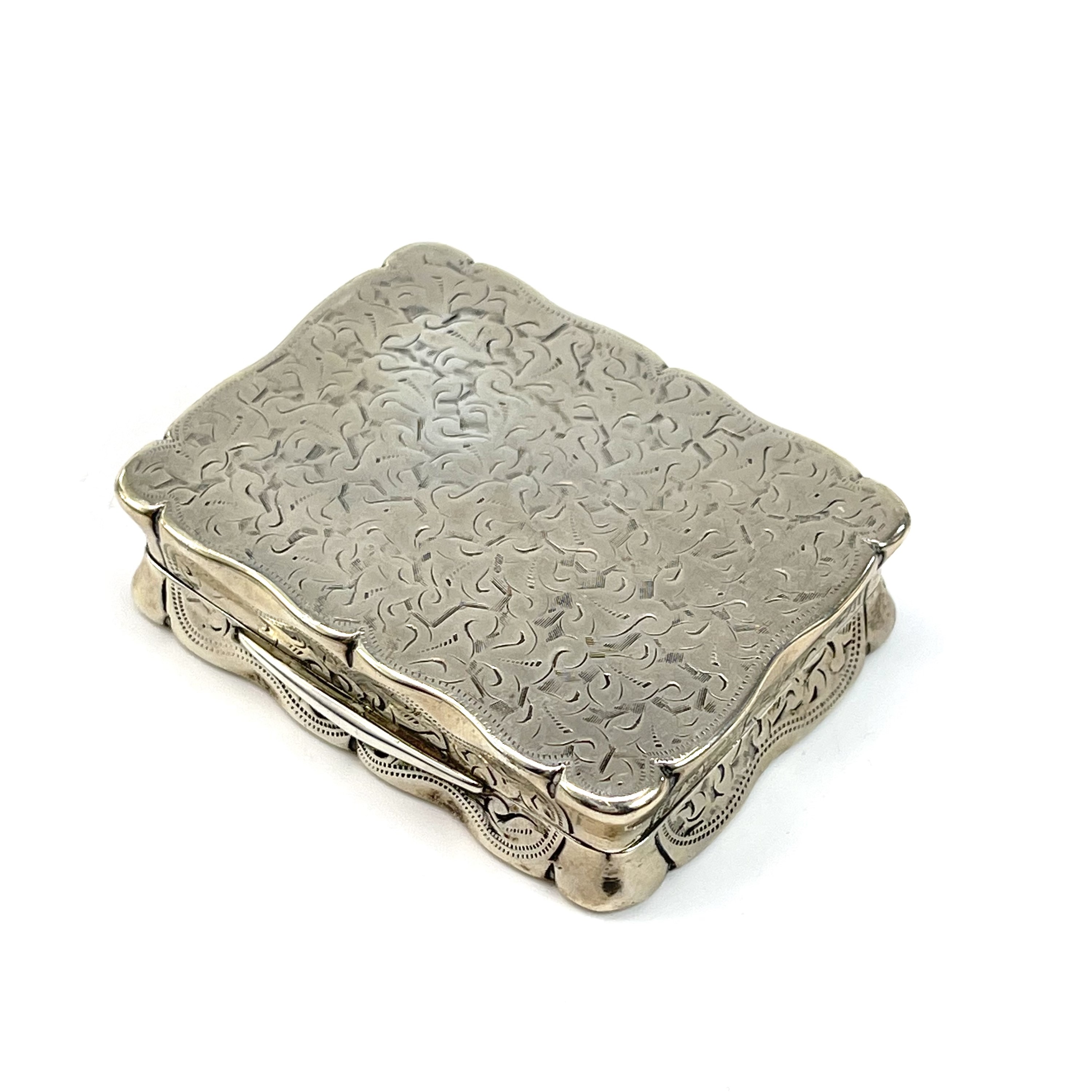 Lot 1 - A Victorian silver snuff box with engraved
