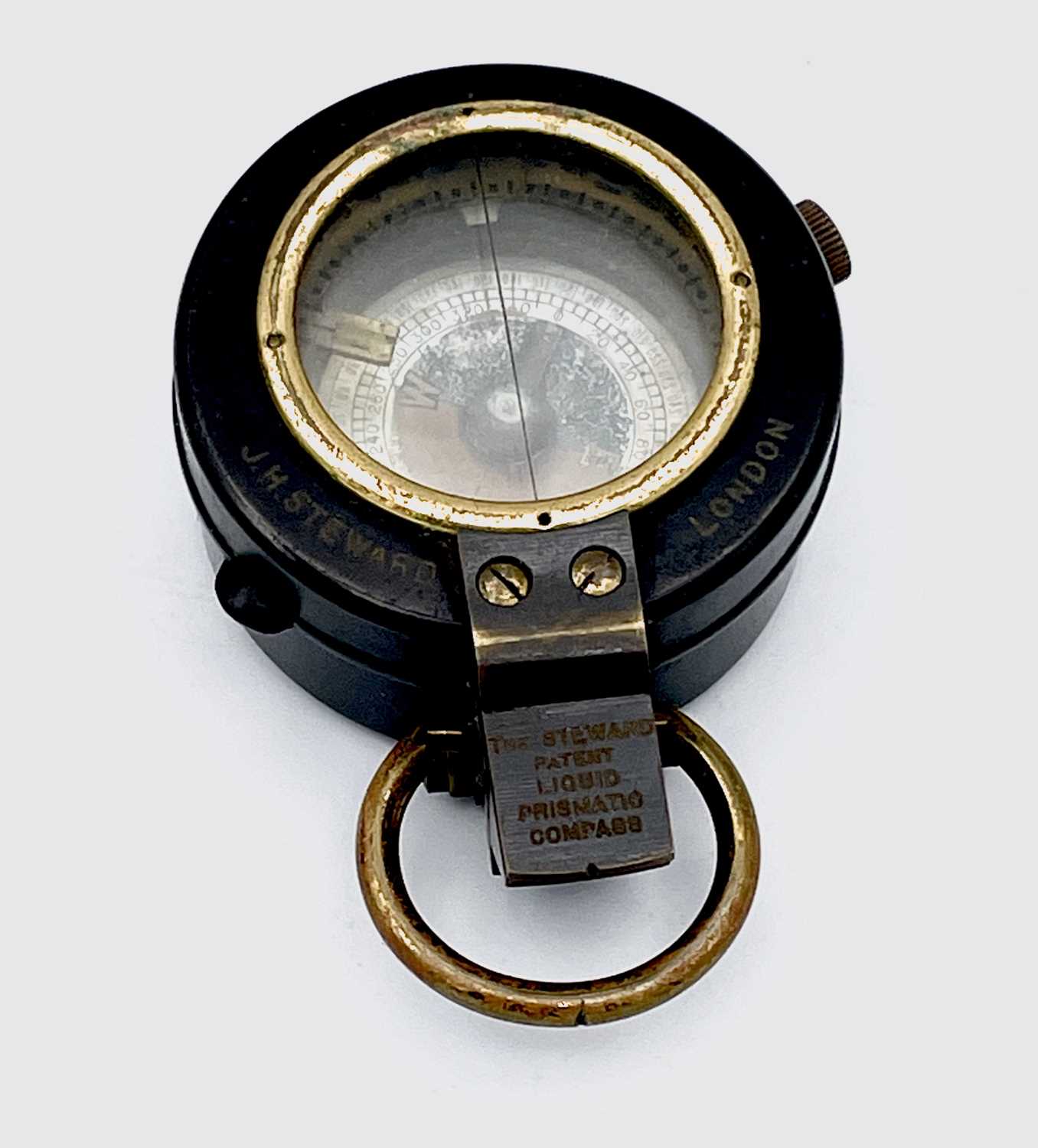 Lot 267 - A WWI lacquered brass marching compass by