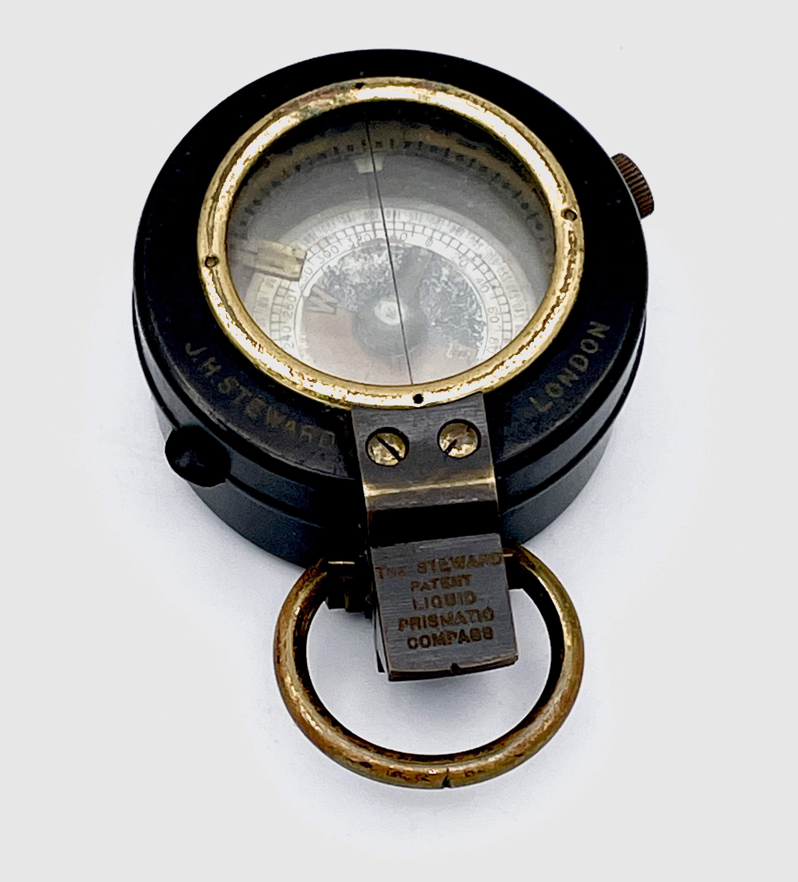 Lot 267 - A WWI lacquered brass marching compass by