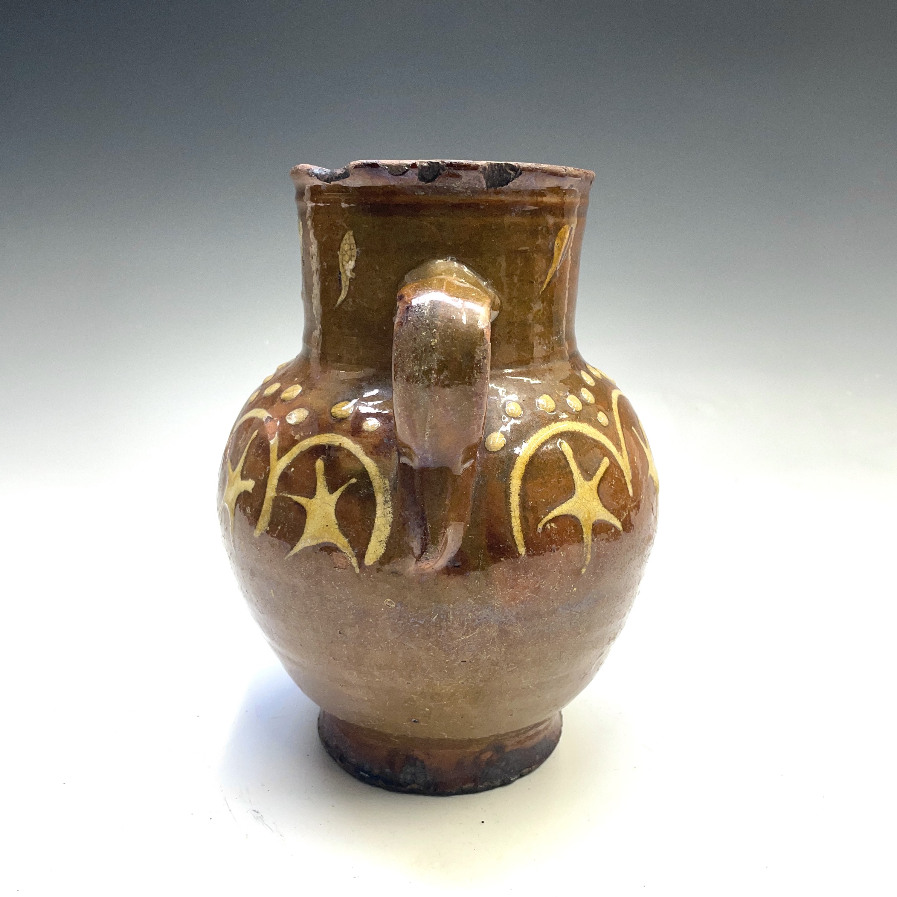 Lot 50 - An English slipware decorated vase, circa