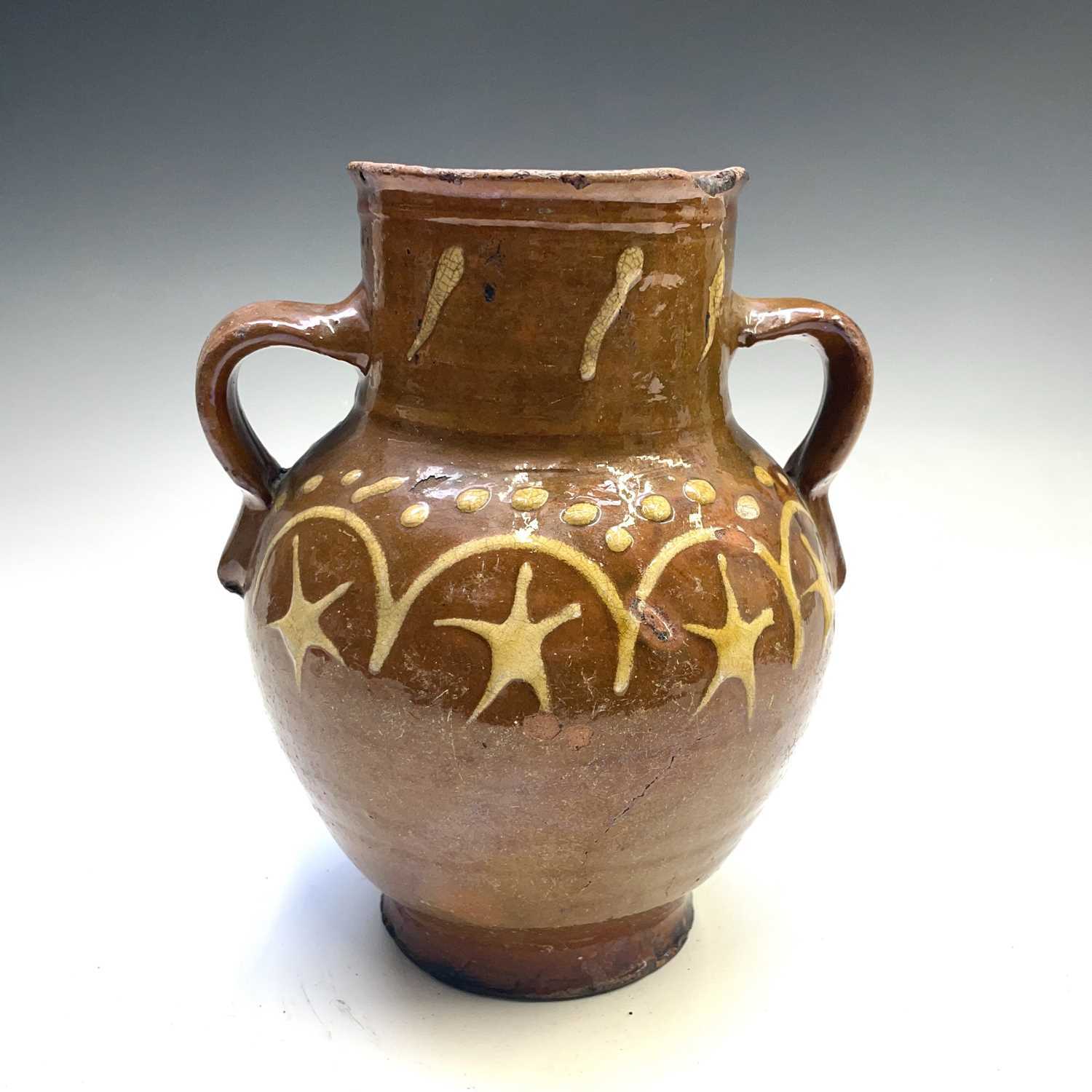 Lot 50 - An English slipware decorated vase, circa