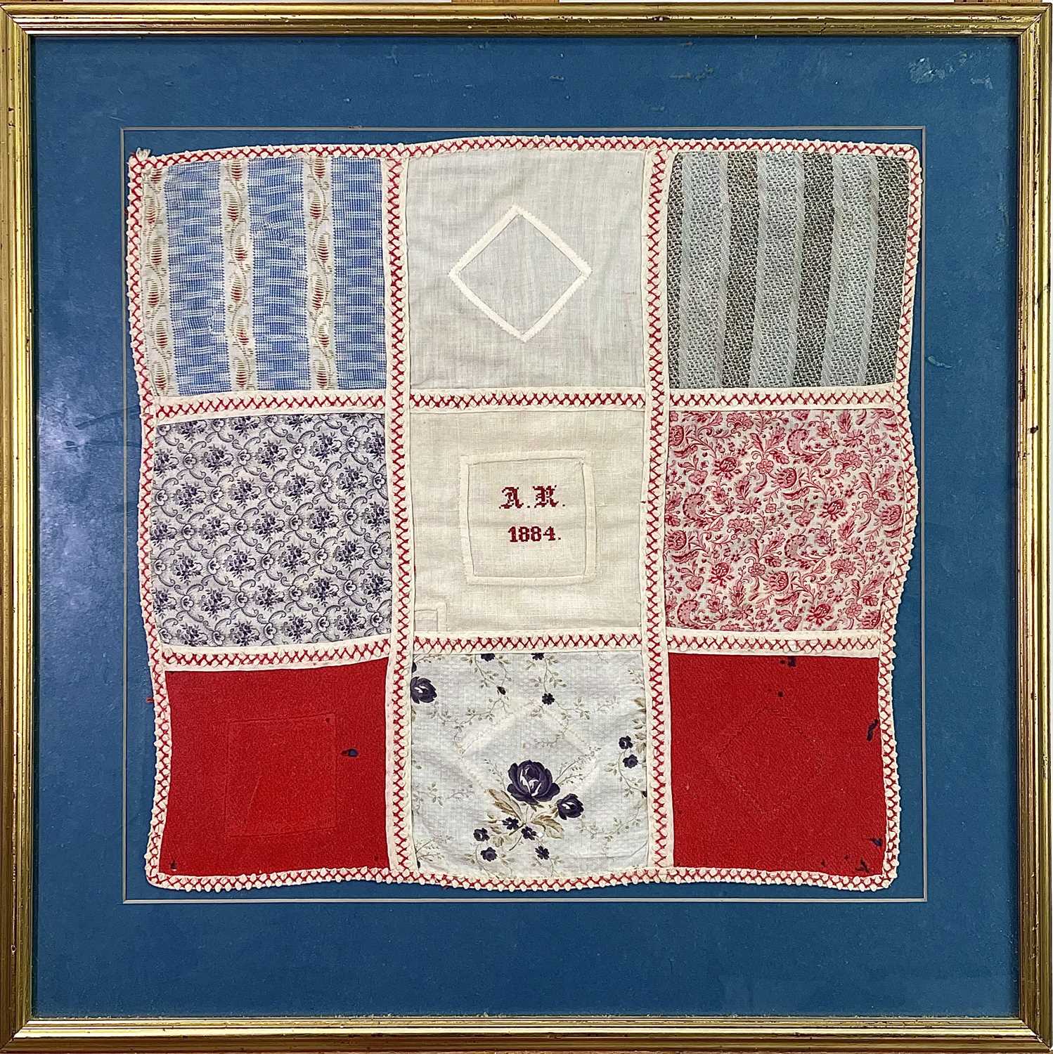 Lot 2819 - A framed Victorian textile with nine