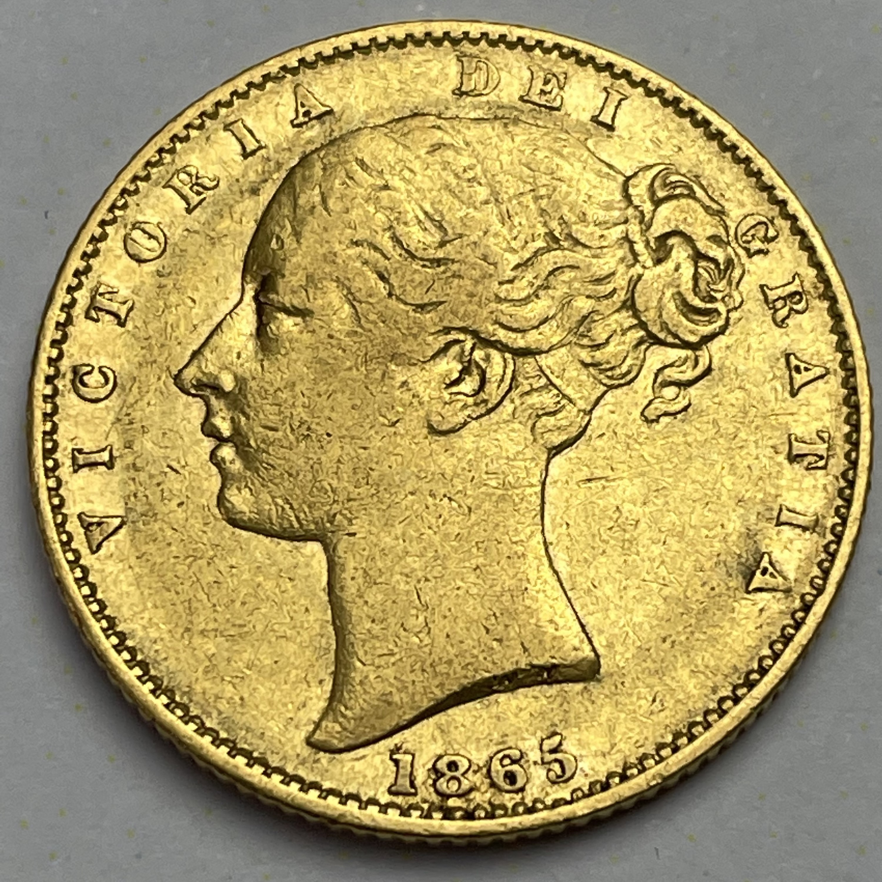 Lot 638 - Victoria 1865 young head full sovereign coin,