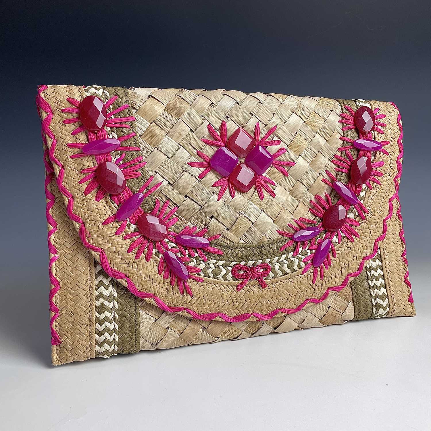 Lot 1015 - Anya Hindmarch, a woven grass clutch bag