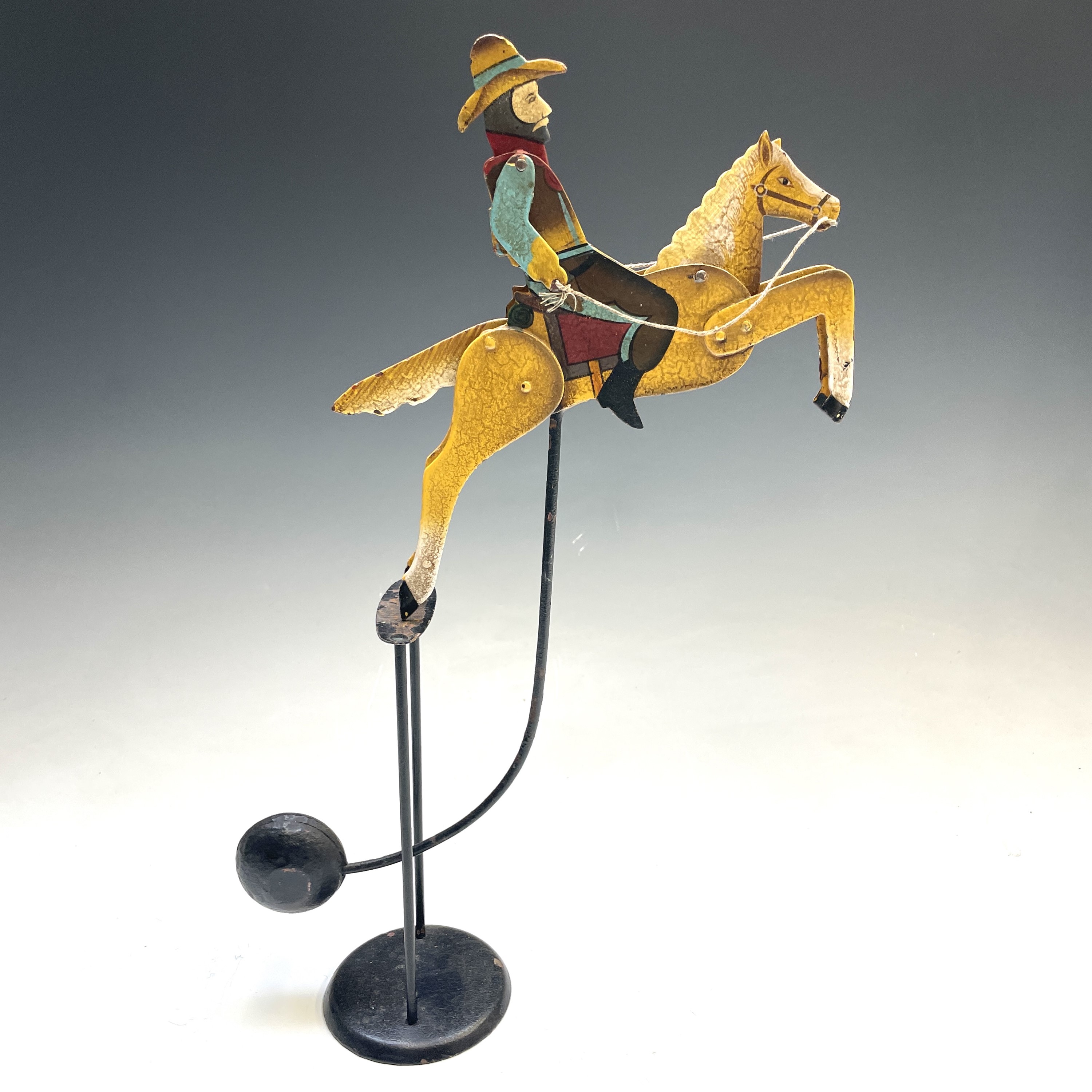 Lot 628 - Bucking Bronco Cowboy Automaton. A well