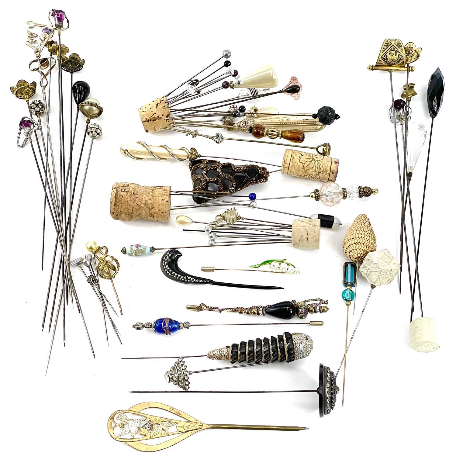 Lot 260 - A collection of hatpins including a silver