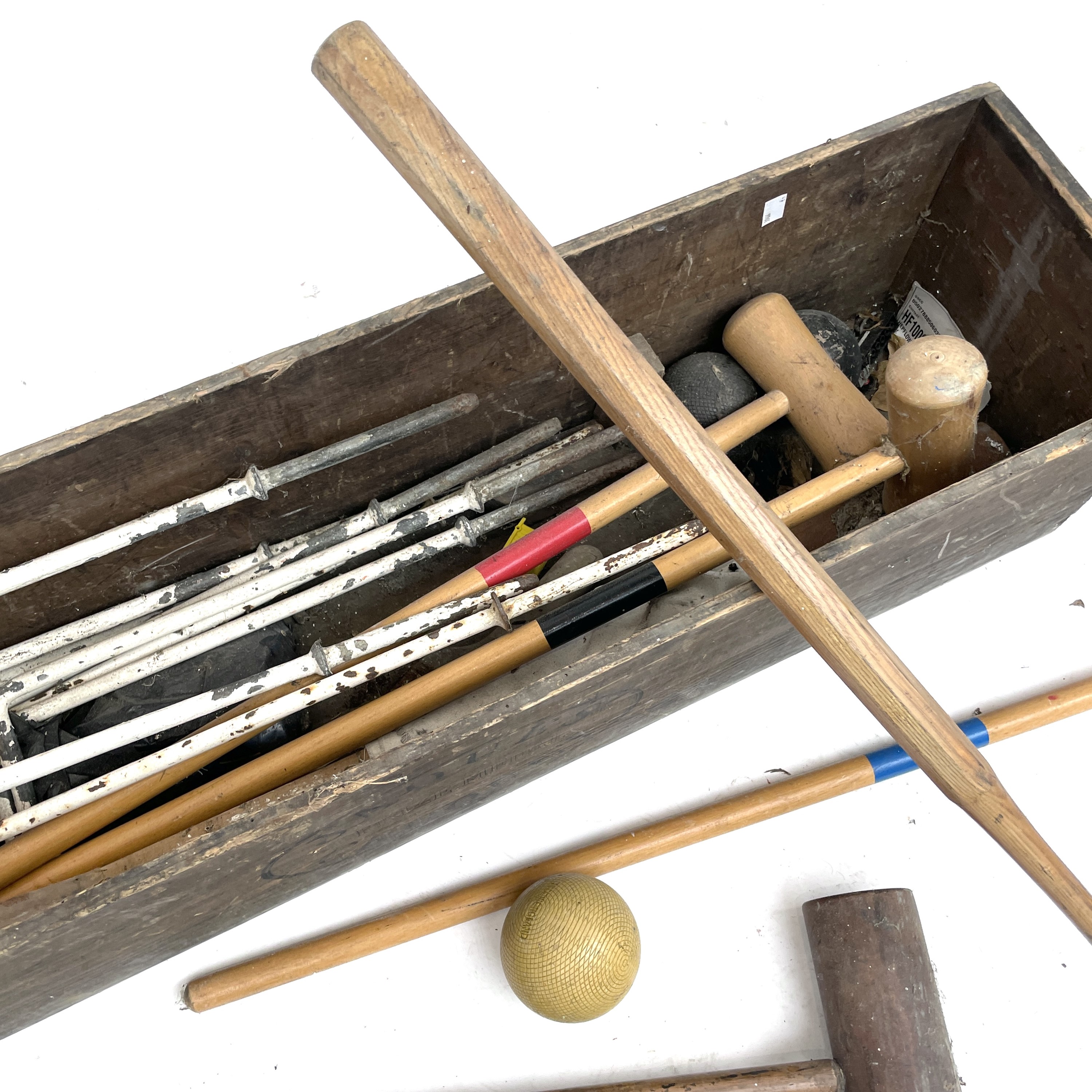 Lot 145 - A part croquet set contained in a Jacques