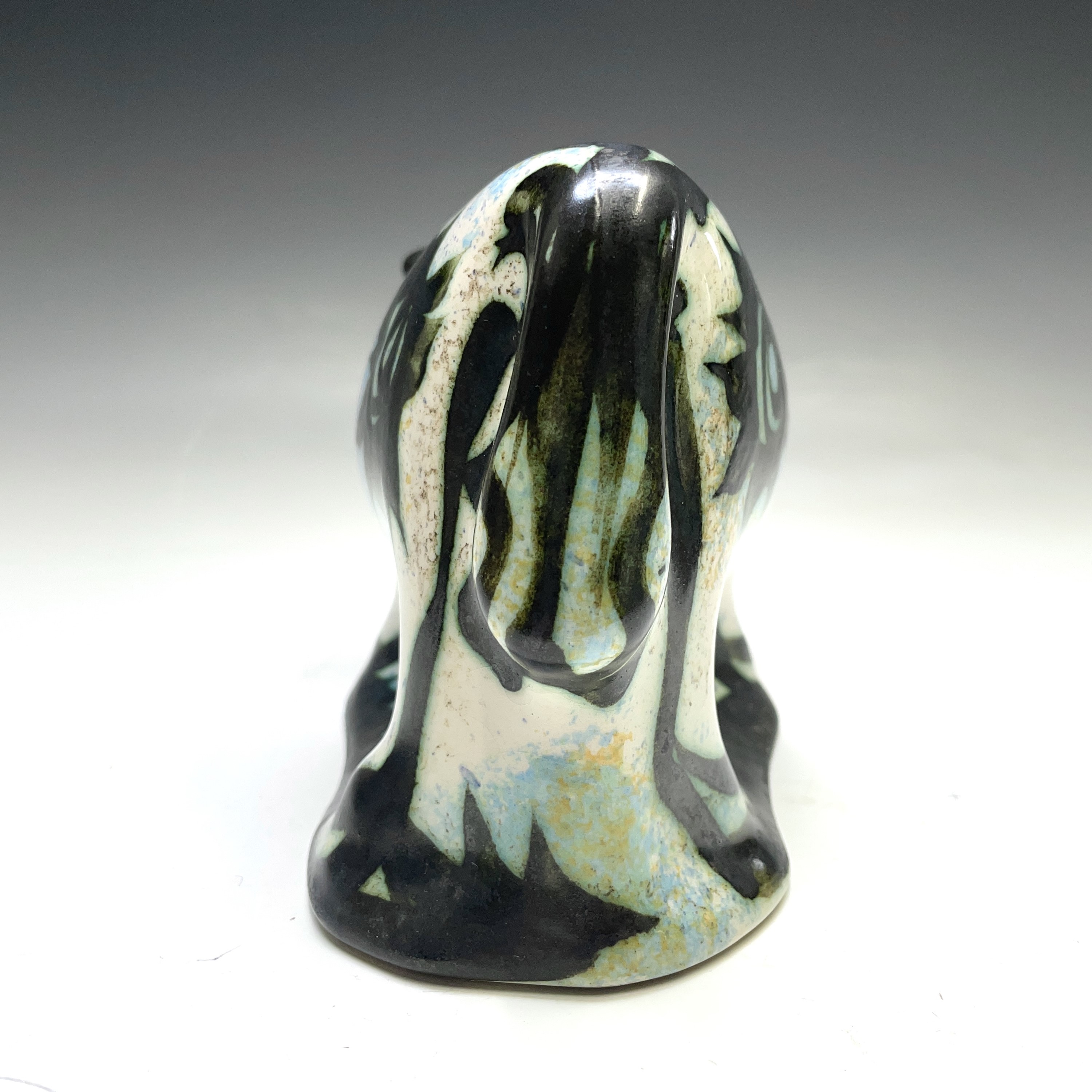 Lot 984 - A Celtic, Newlyn pottery bull figure,