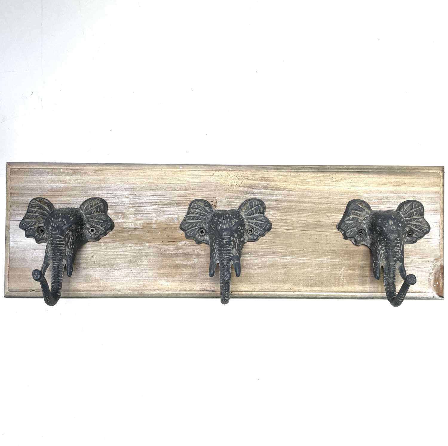 Lot 201 - An elephant head coat rack with three hooks