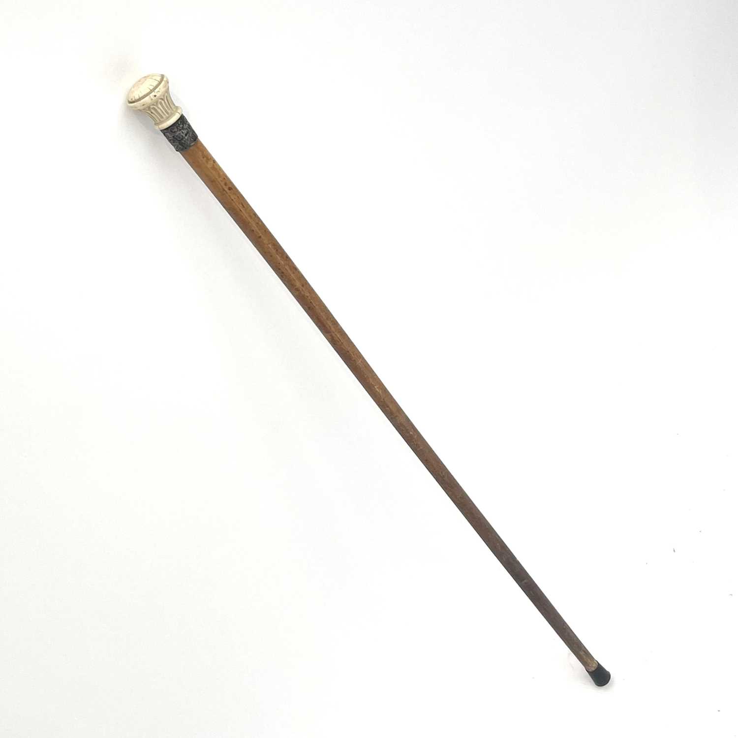 Lot 175 - A late Victorian cane, with turned ivory