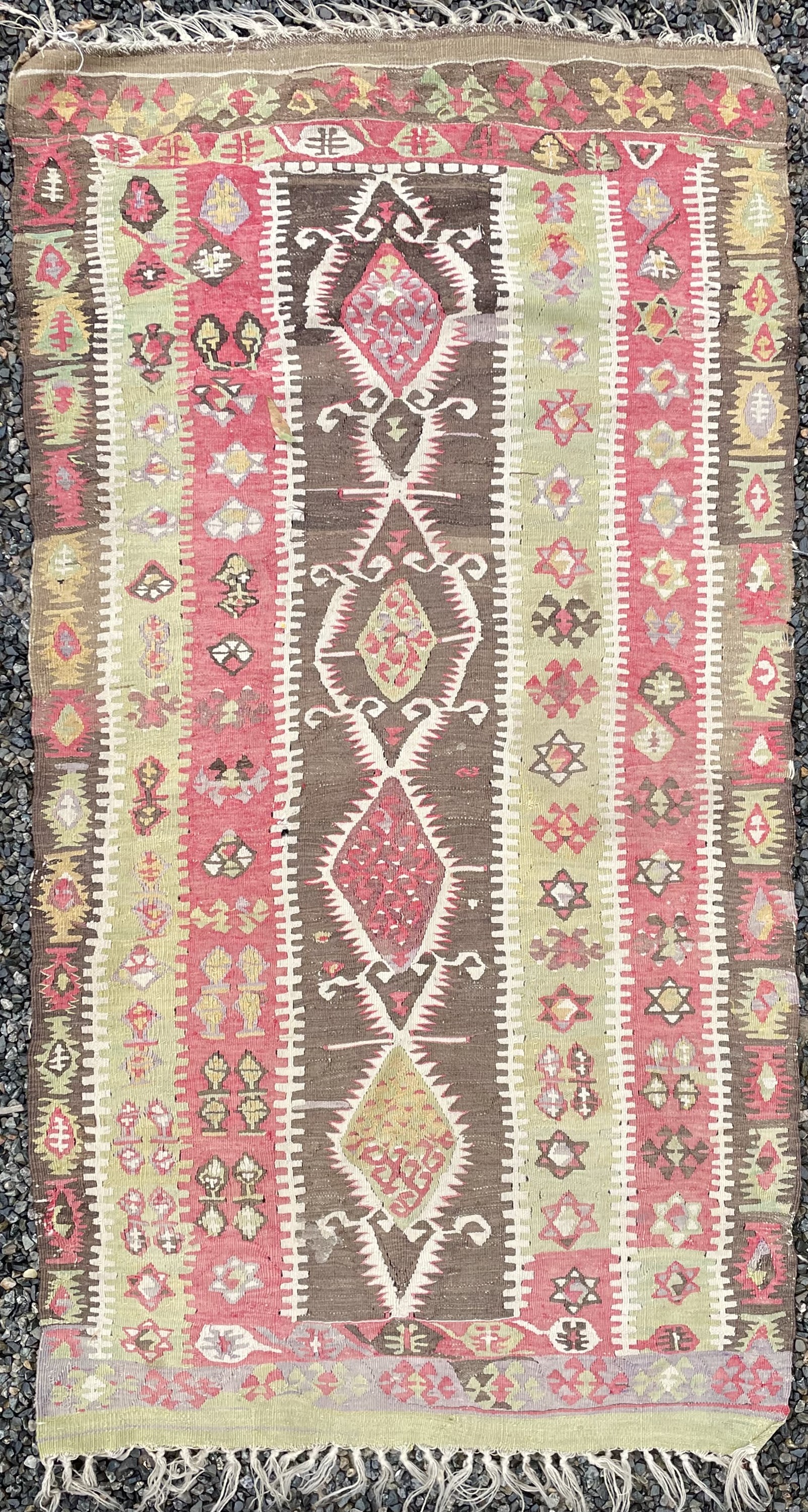 Lot 1239 - An Anatolian kelim, circa 1900, with four