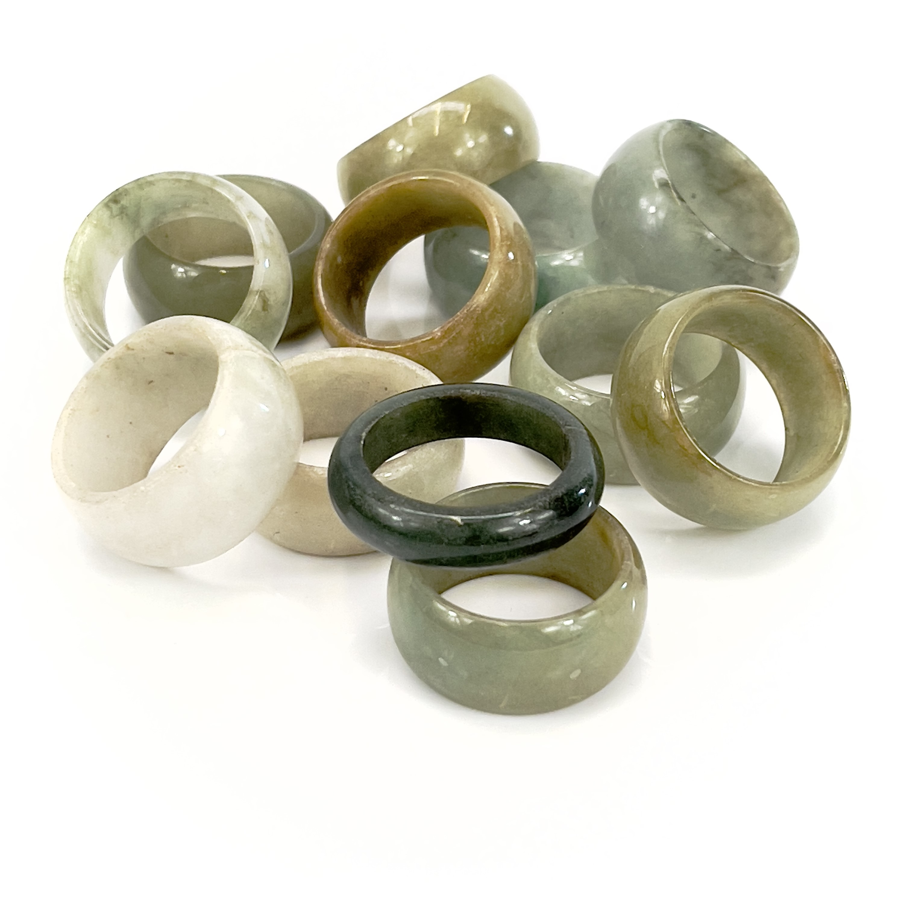 Lot 159 - Twelve Chinese miscellanous jade rings,