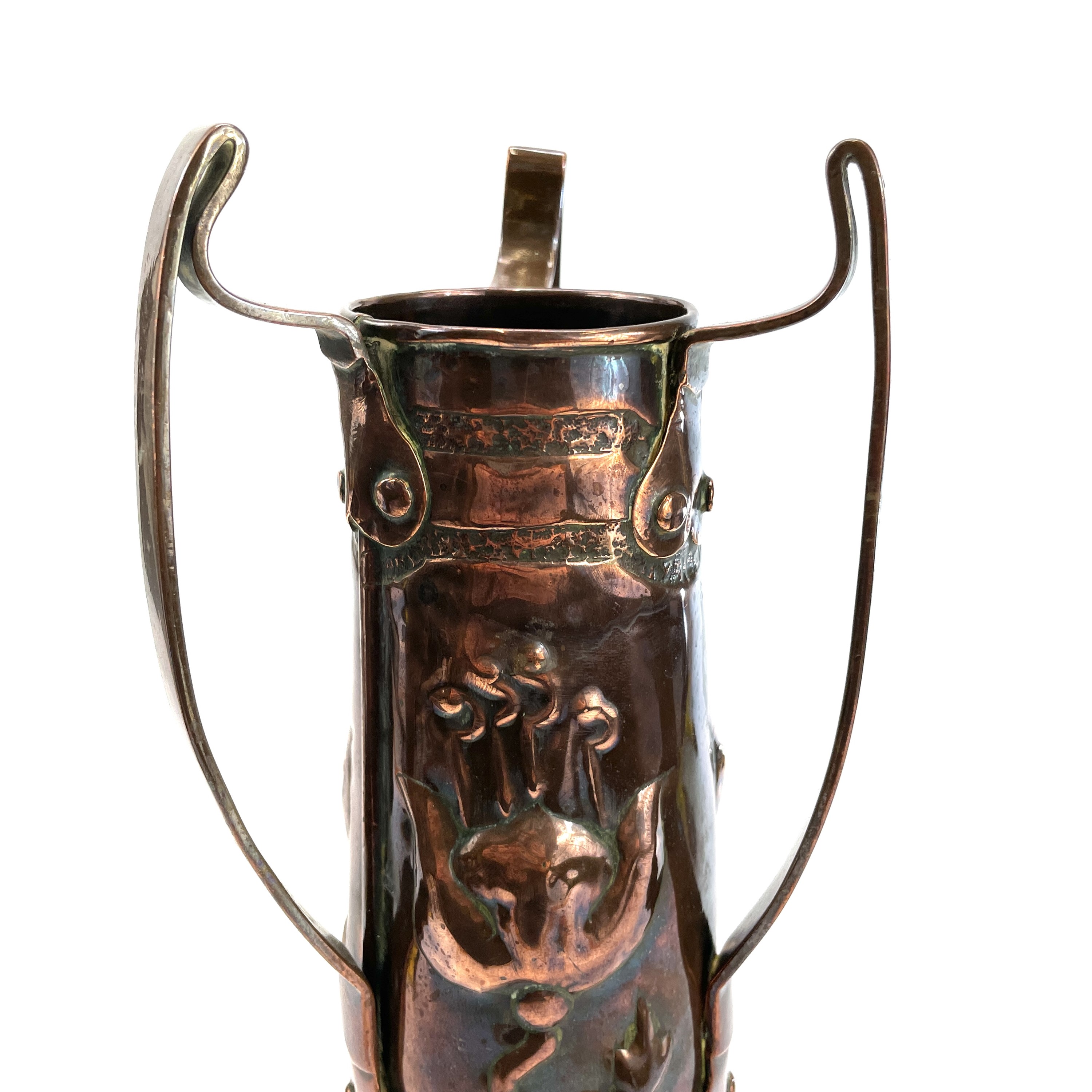 Lot 65 - An Art Nouveau copper three handle vase with