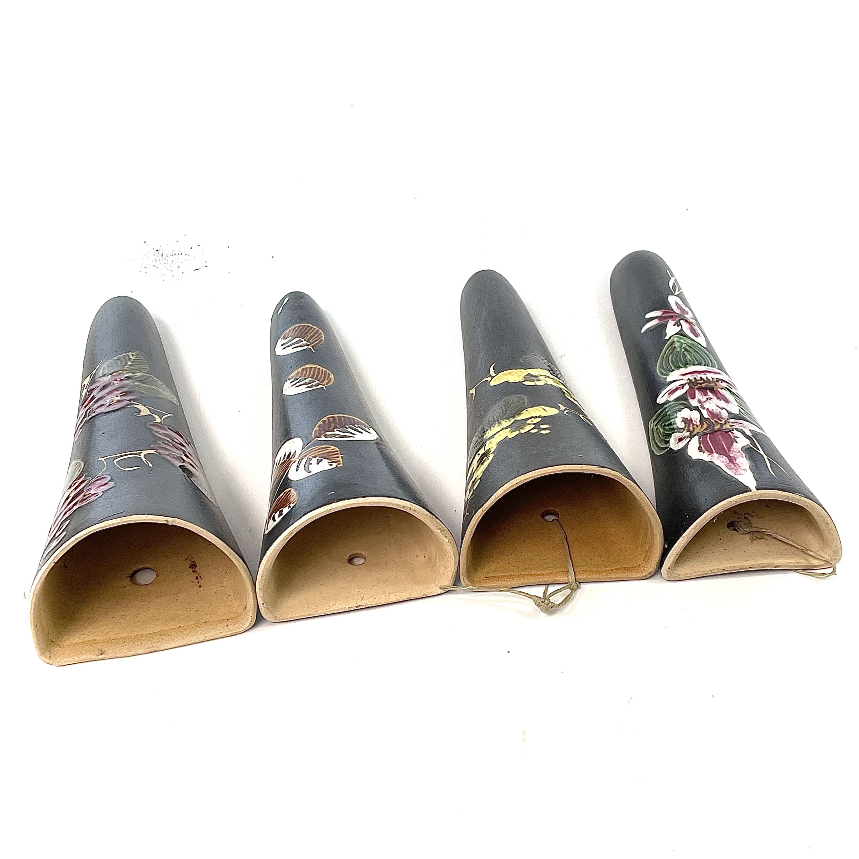 Lot 844 - Four Marazion pottery wall pockets, each