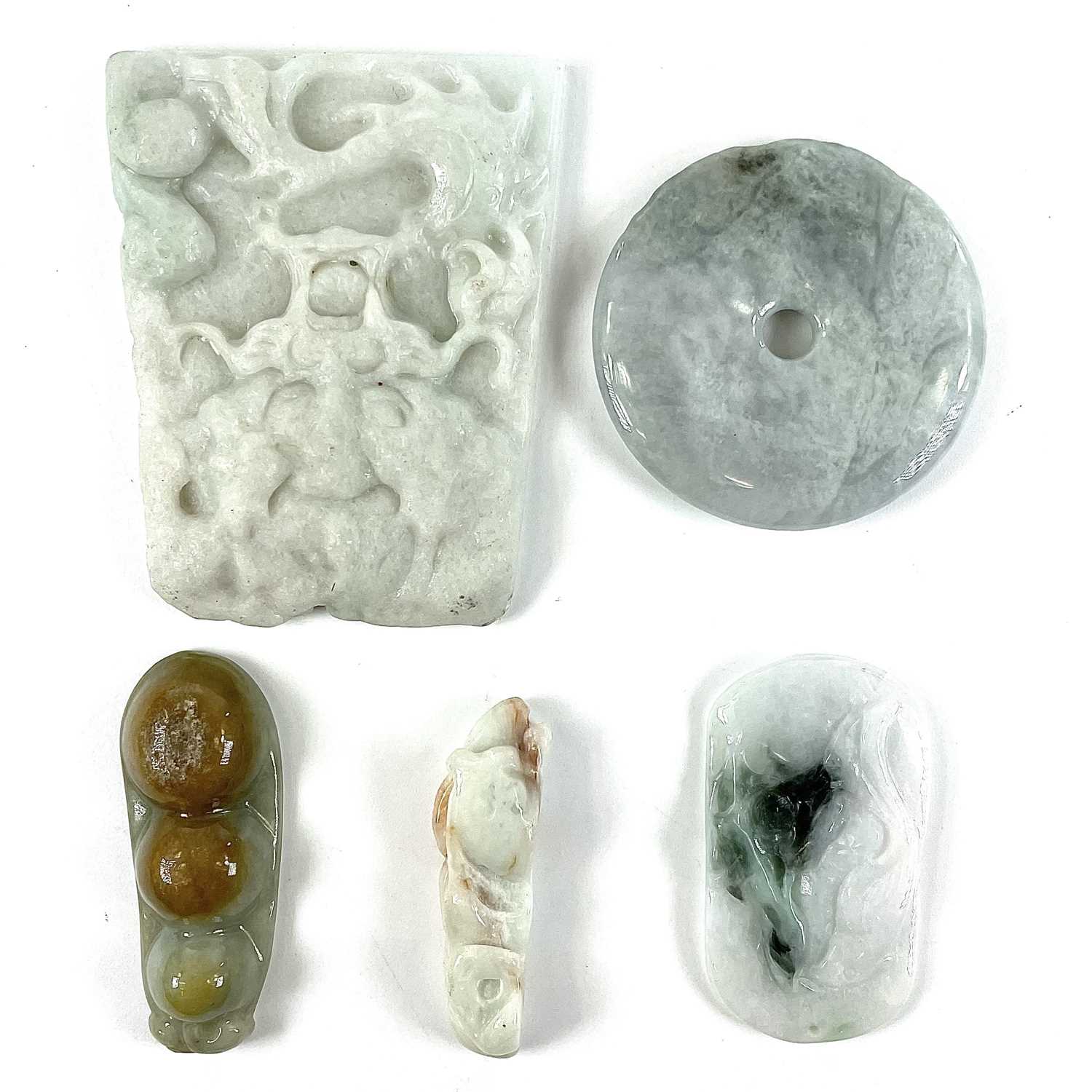 Lot 268 - A jade carving of a dragon, 6.5 x 5.3cm and