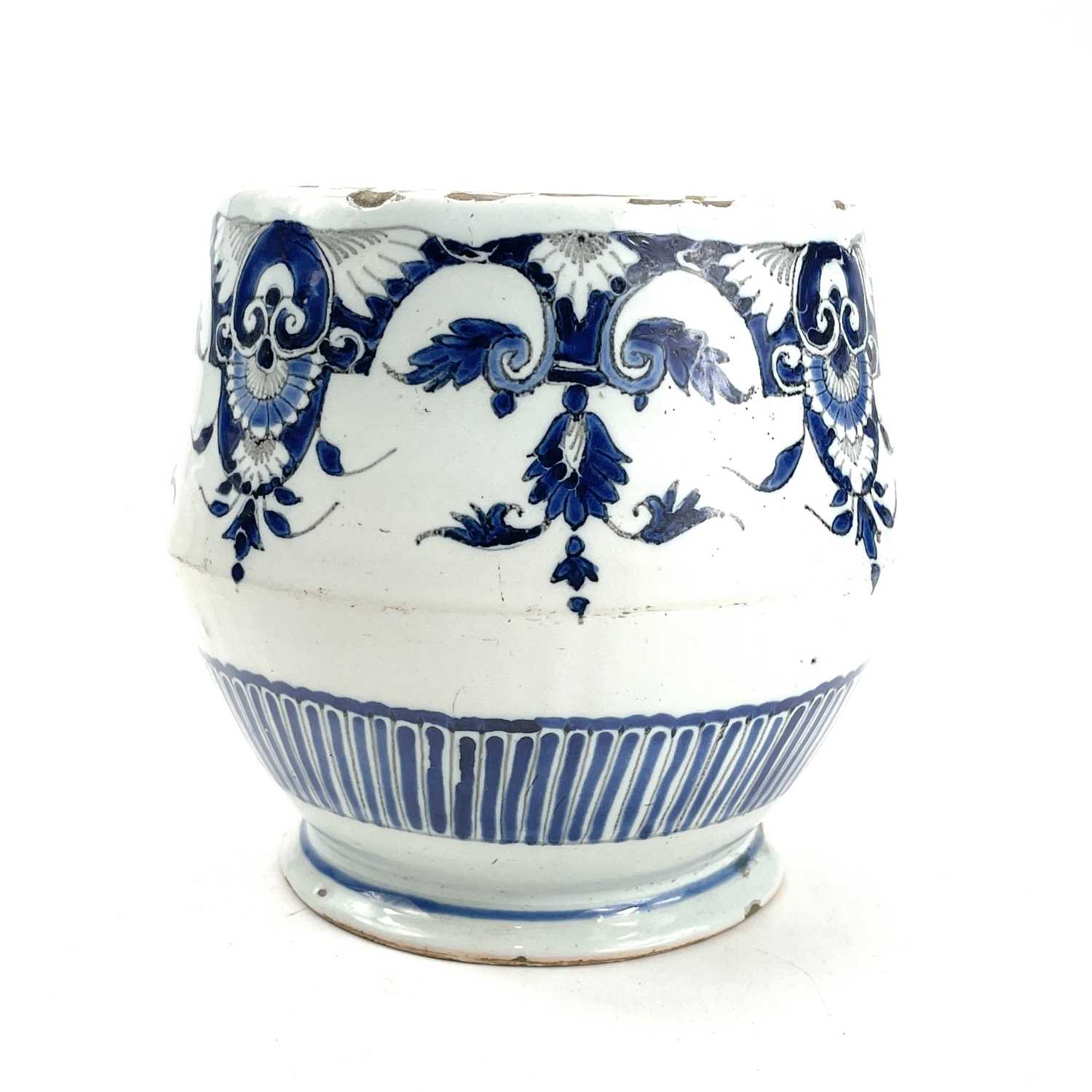 Lot 924 - An unusual shaped delft bowl decorated in