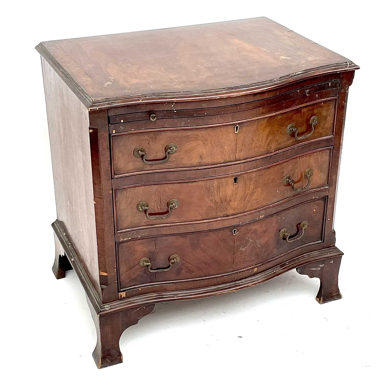 Lot 1816 - A walnut serpentine front chest, 20th