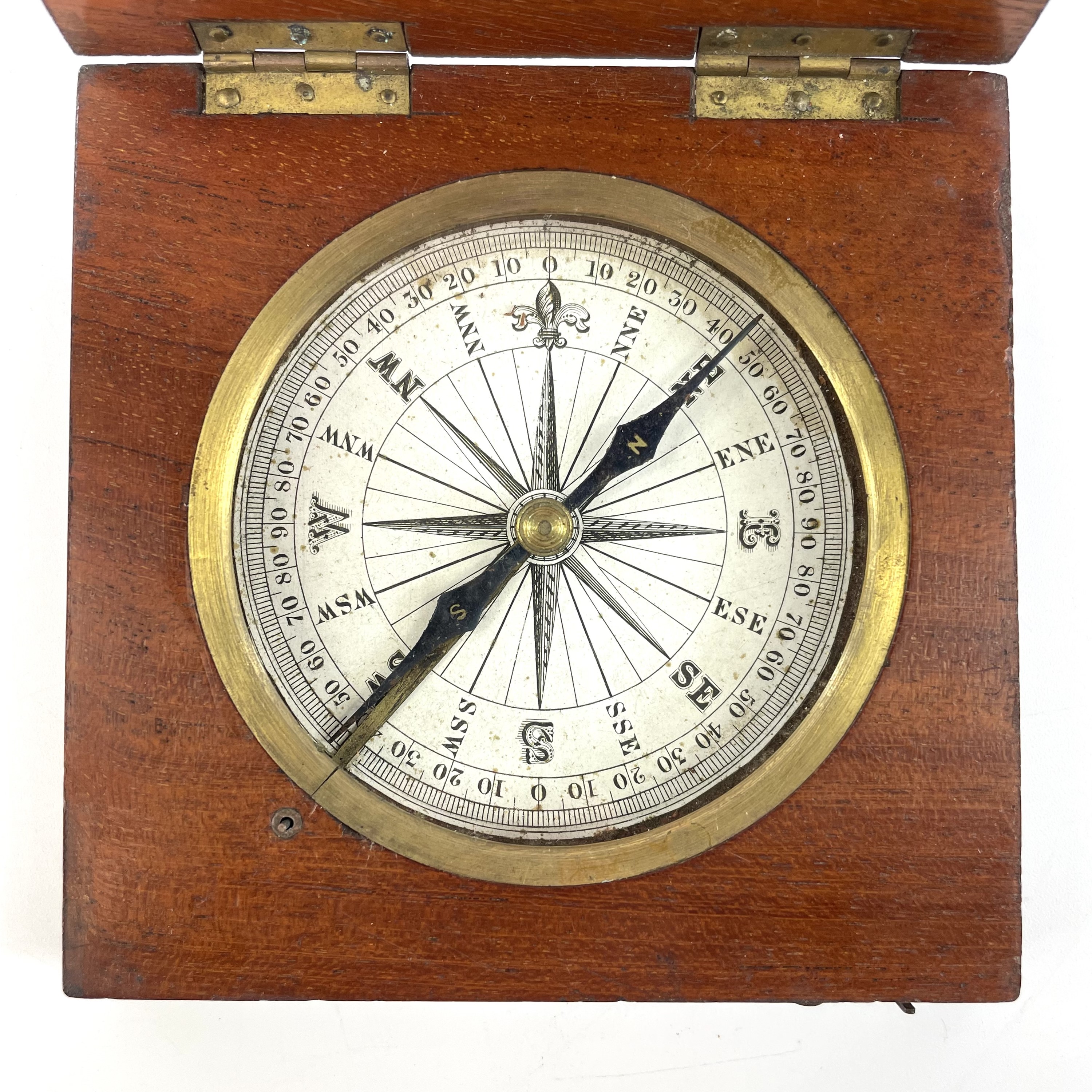 Lot 135 - A 19th century compass with printed card