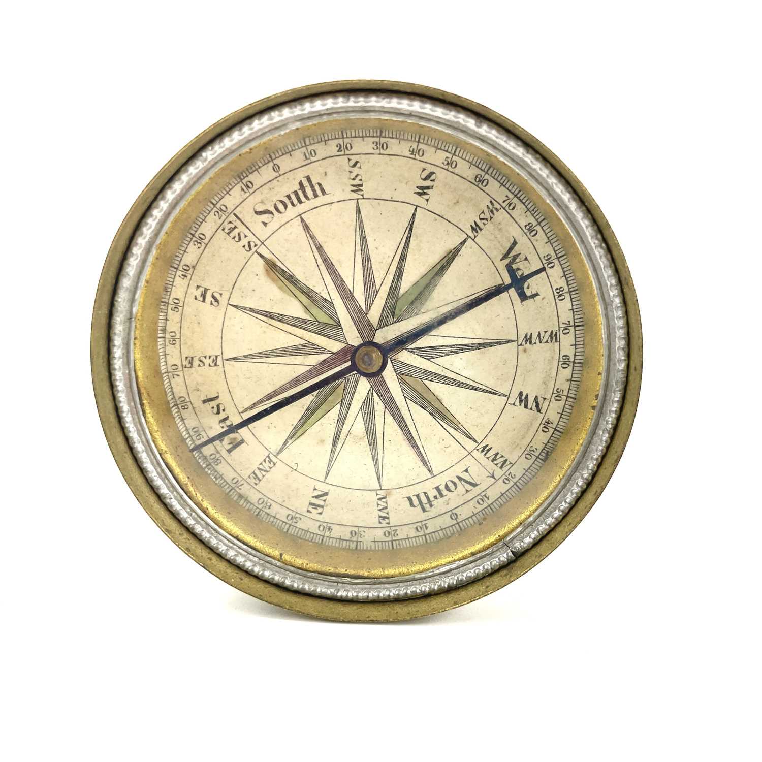 Lot 165 - An early 19th century brass compass with a